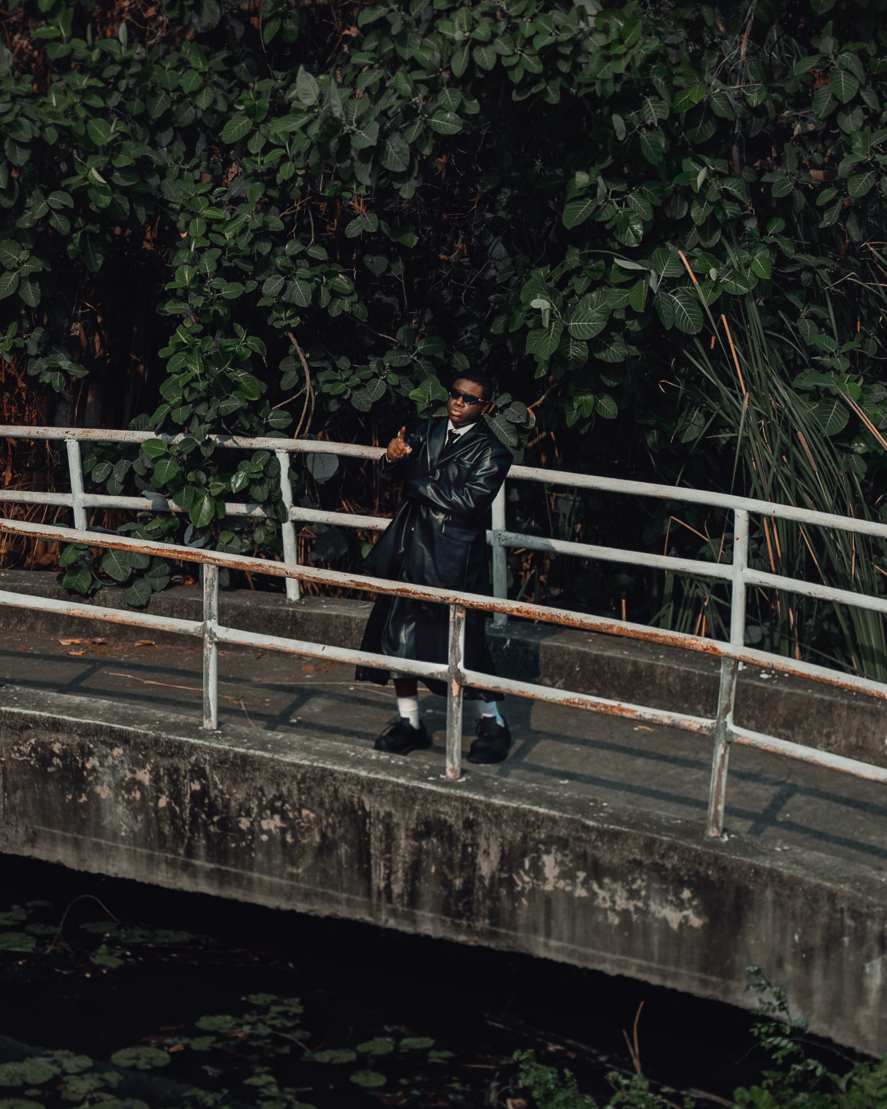 Stylish Man Standing on Urban Bridge Outdoors · Free Stock Photo