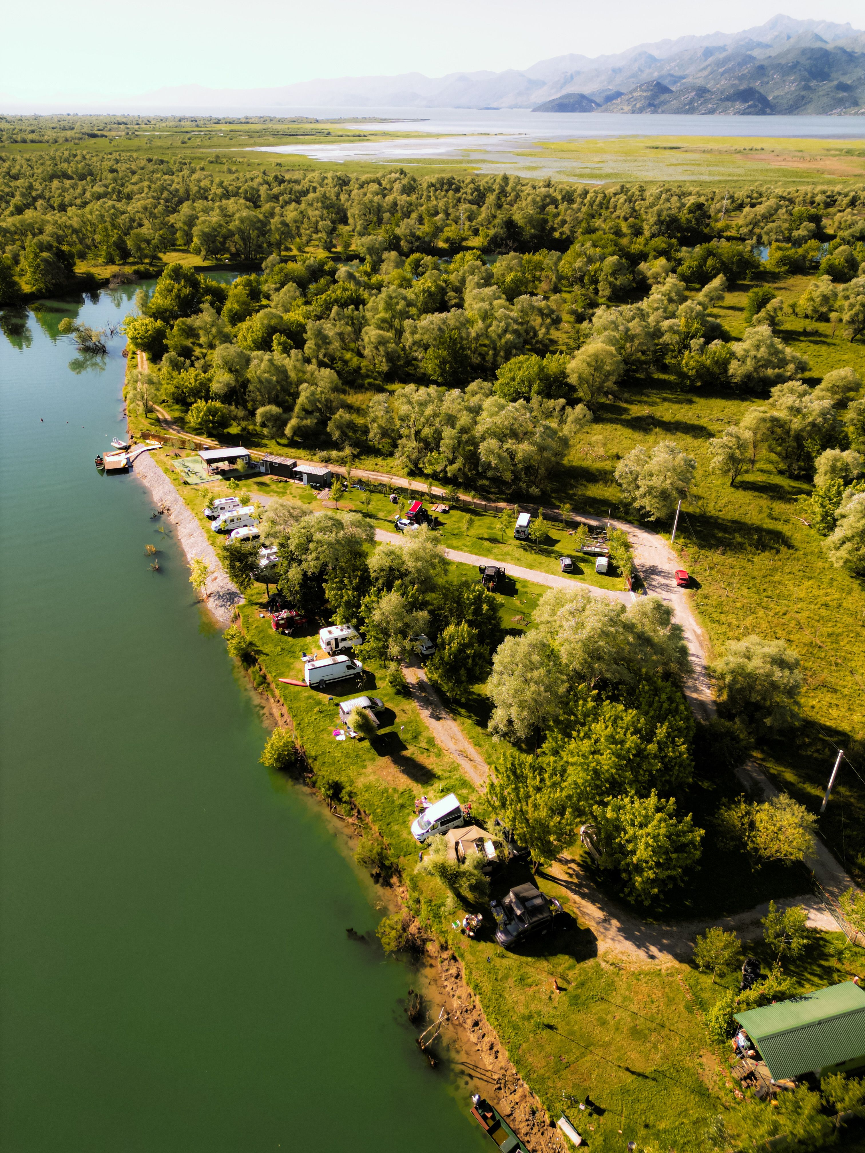 Aerial View of Lakeside Camping Area in Summer · Free Stock Photo