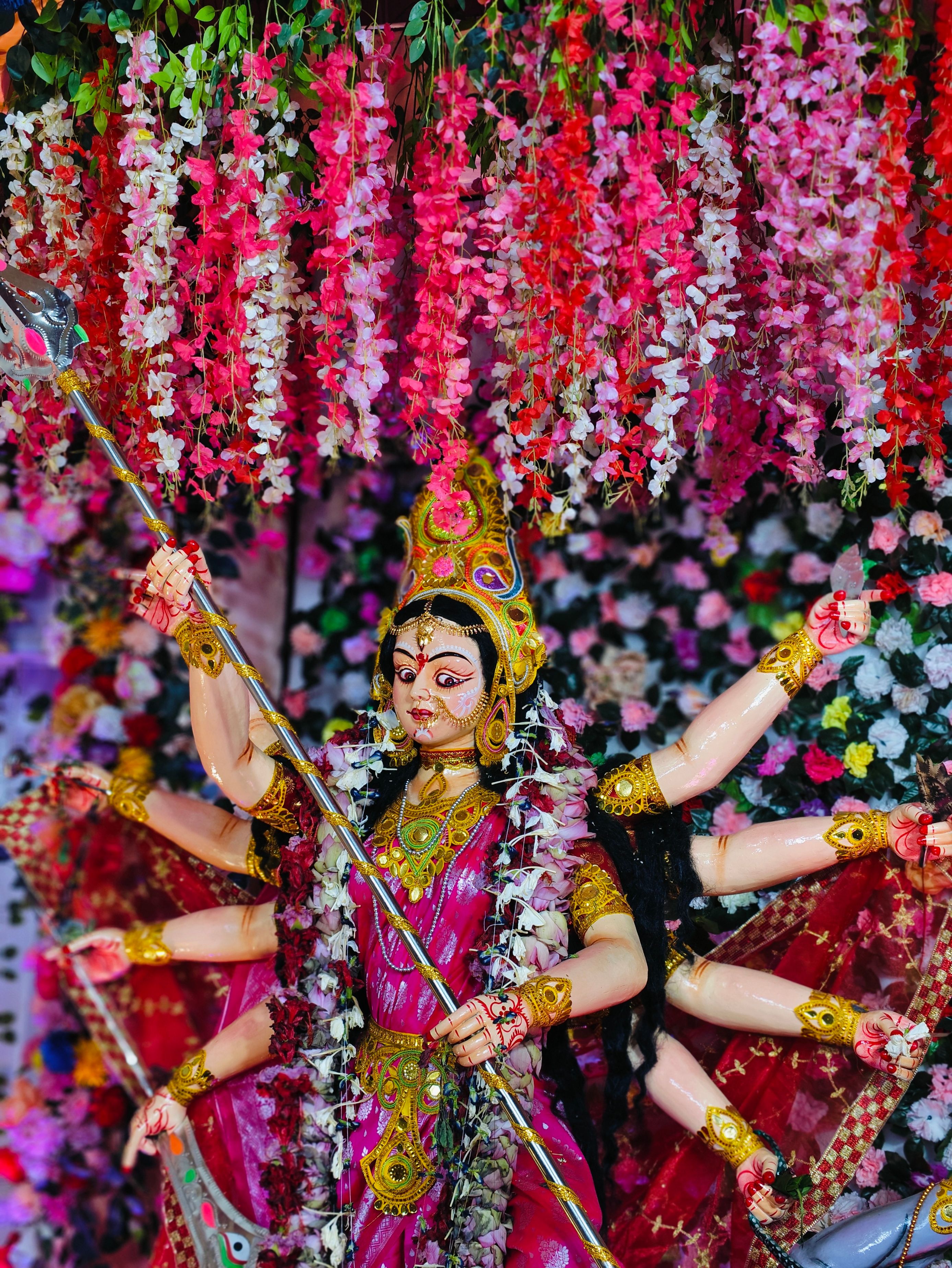Colorful Durga Idol with Floral Background · Free Stock Photo