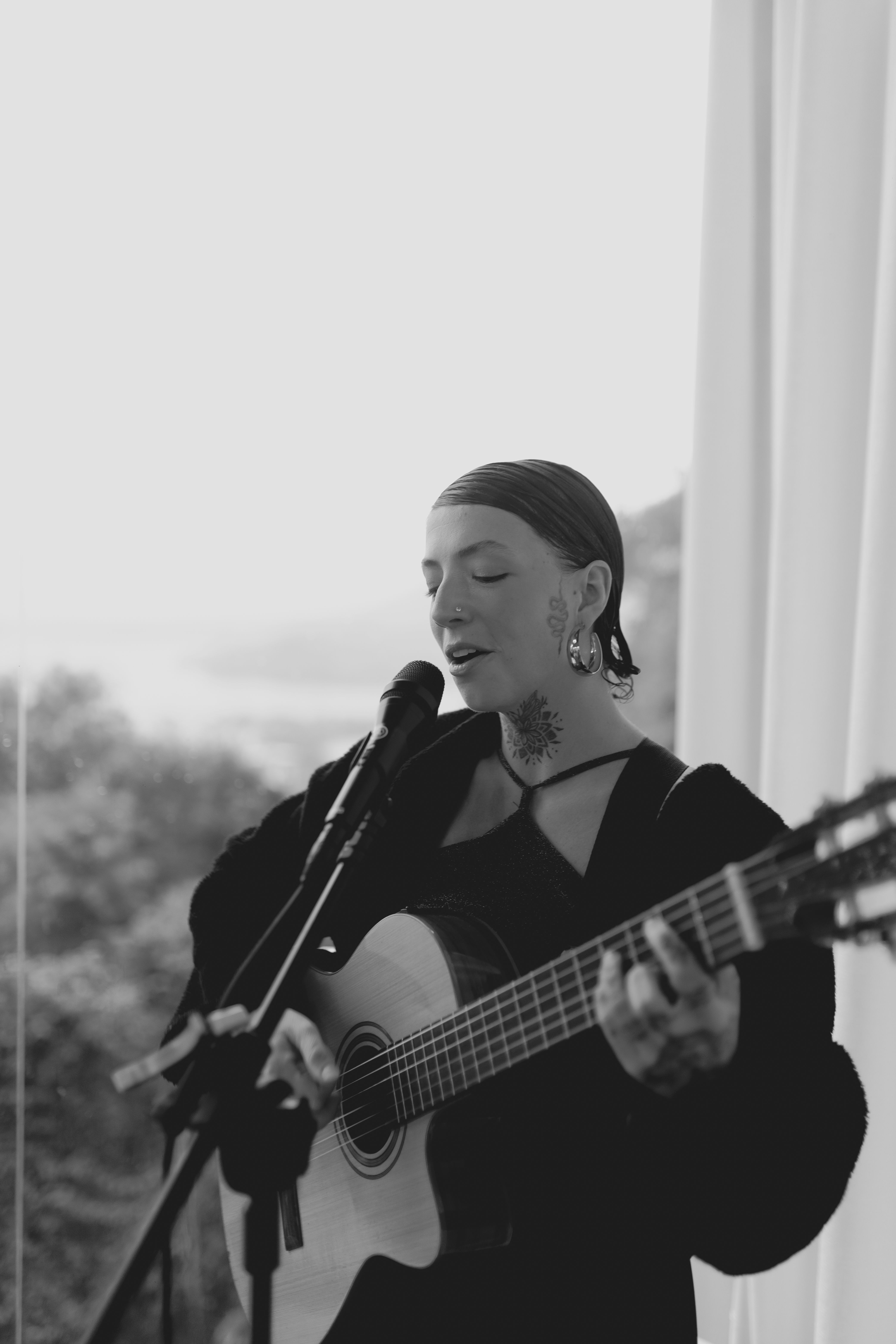 Black and White Portrait of Musician Singing · Free Stock Photo