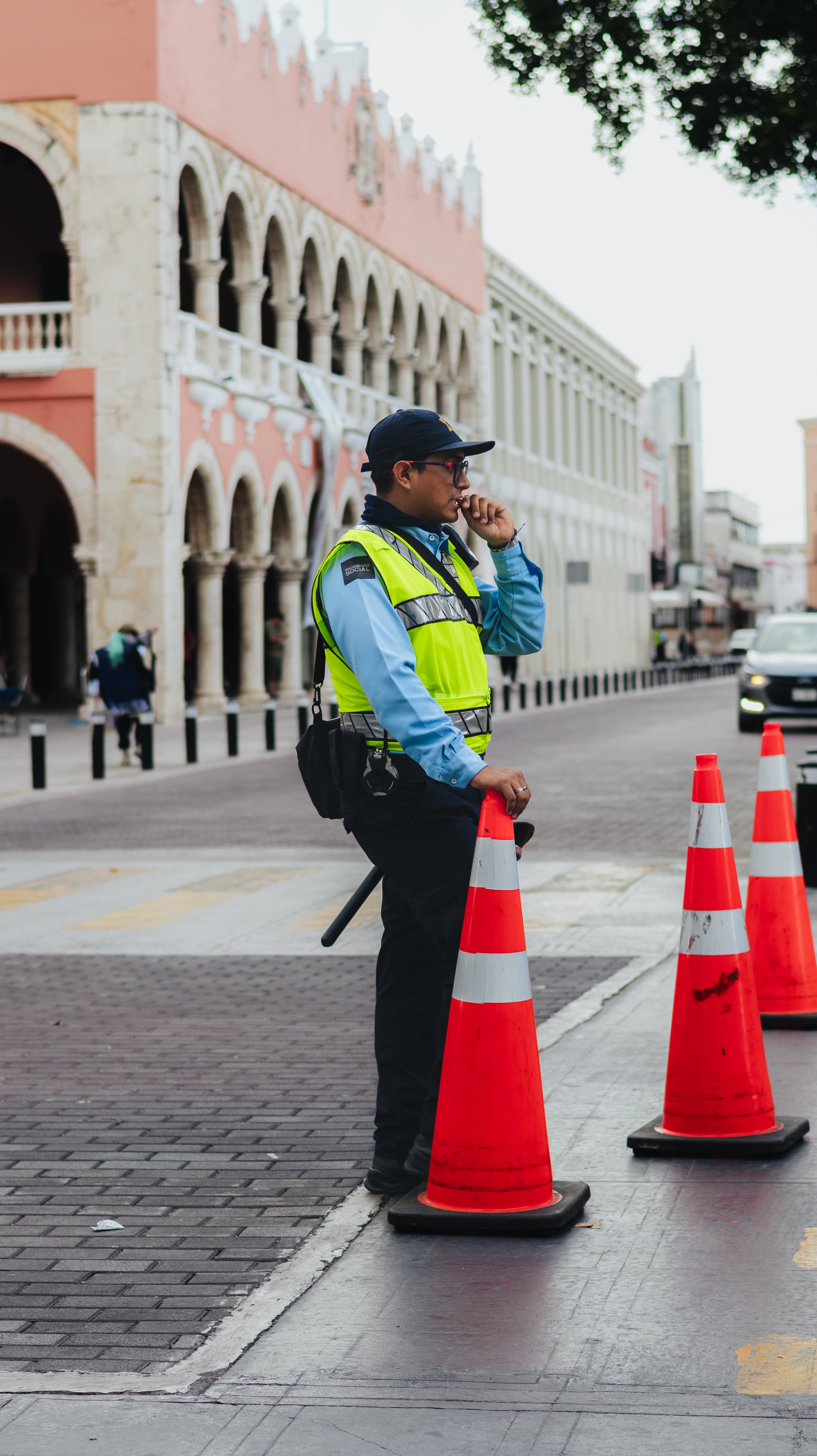 Traffic Police Officer Directing Street in Urban Area · Free Stock Photo