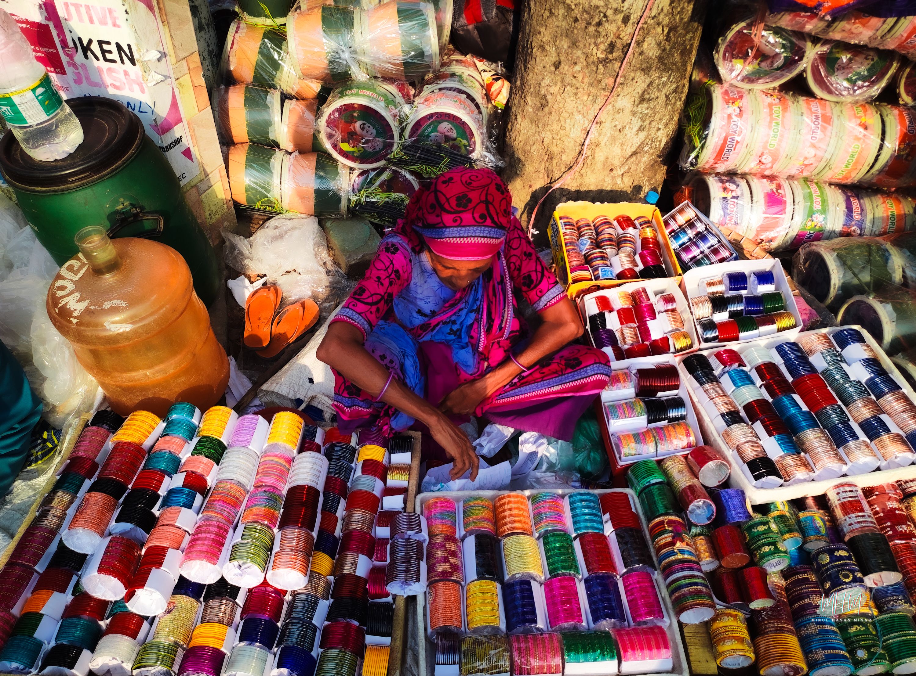 Elderly Woman selling Traditional Fabric · Free Stock Photo