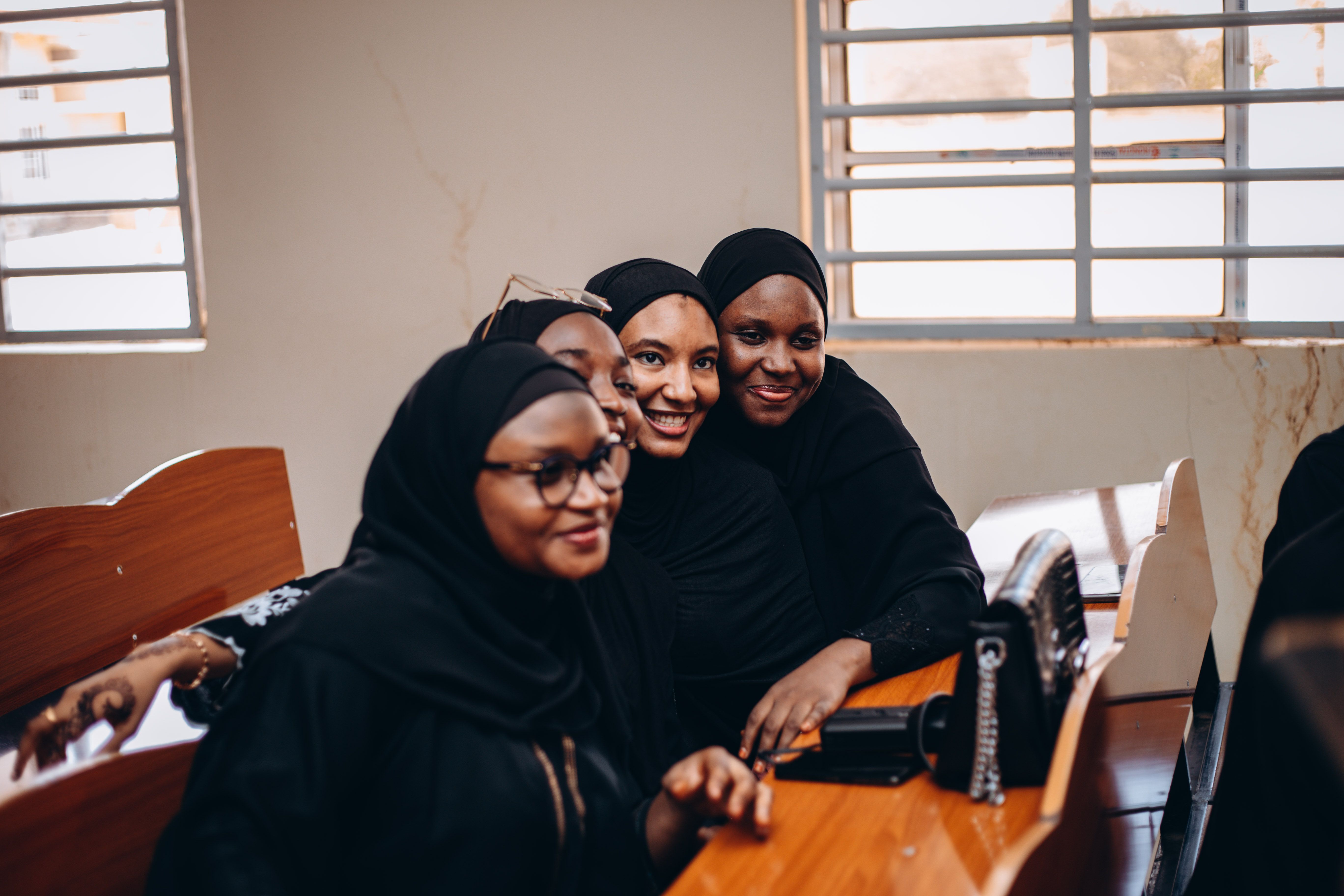 Smiling Group of Women in Classroom Setting · Free Stock Photo