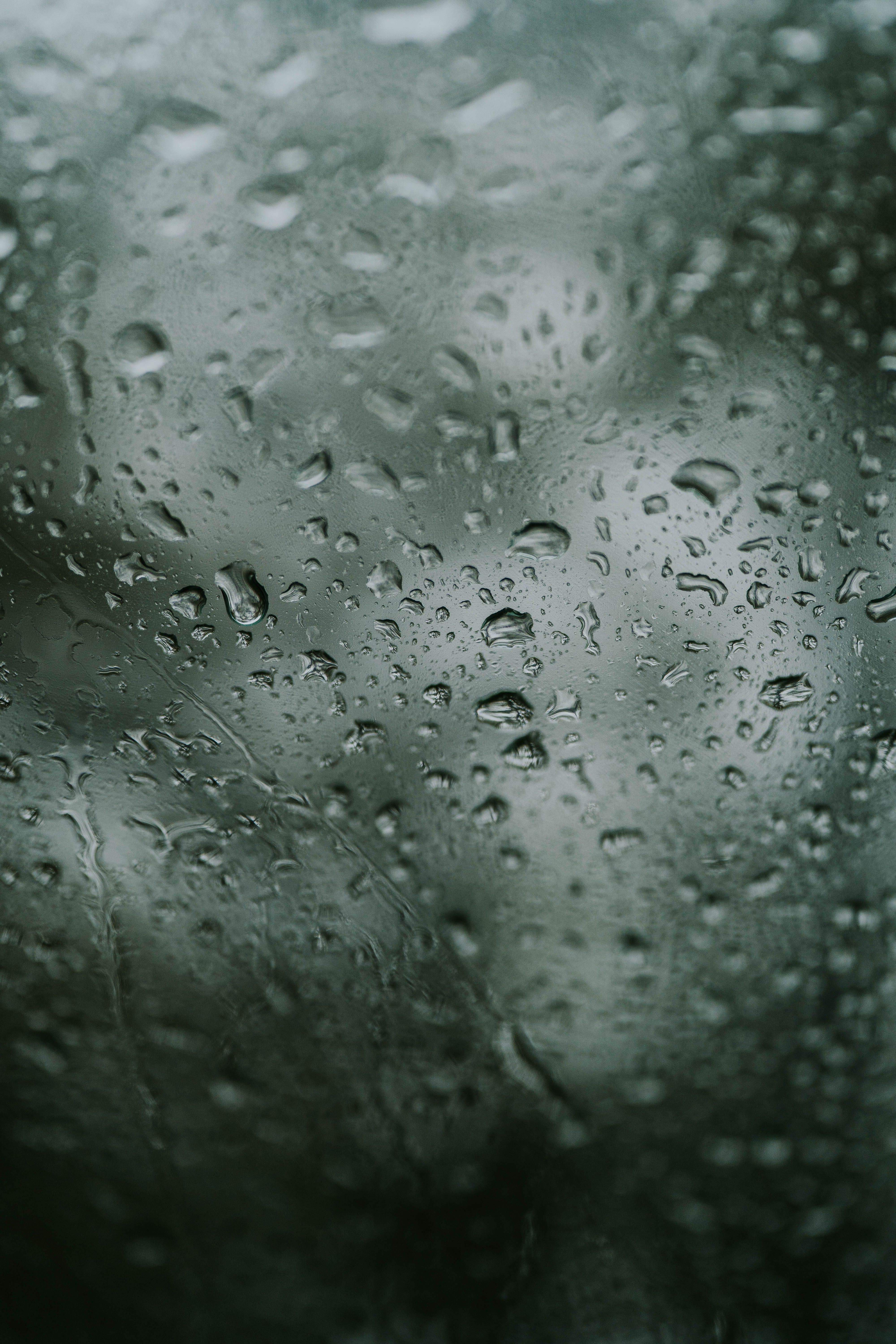 Close-up of Raindrops on a Window Pane · Free Stock Photo