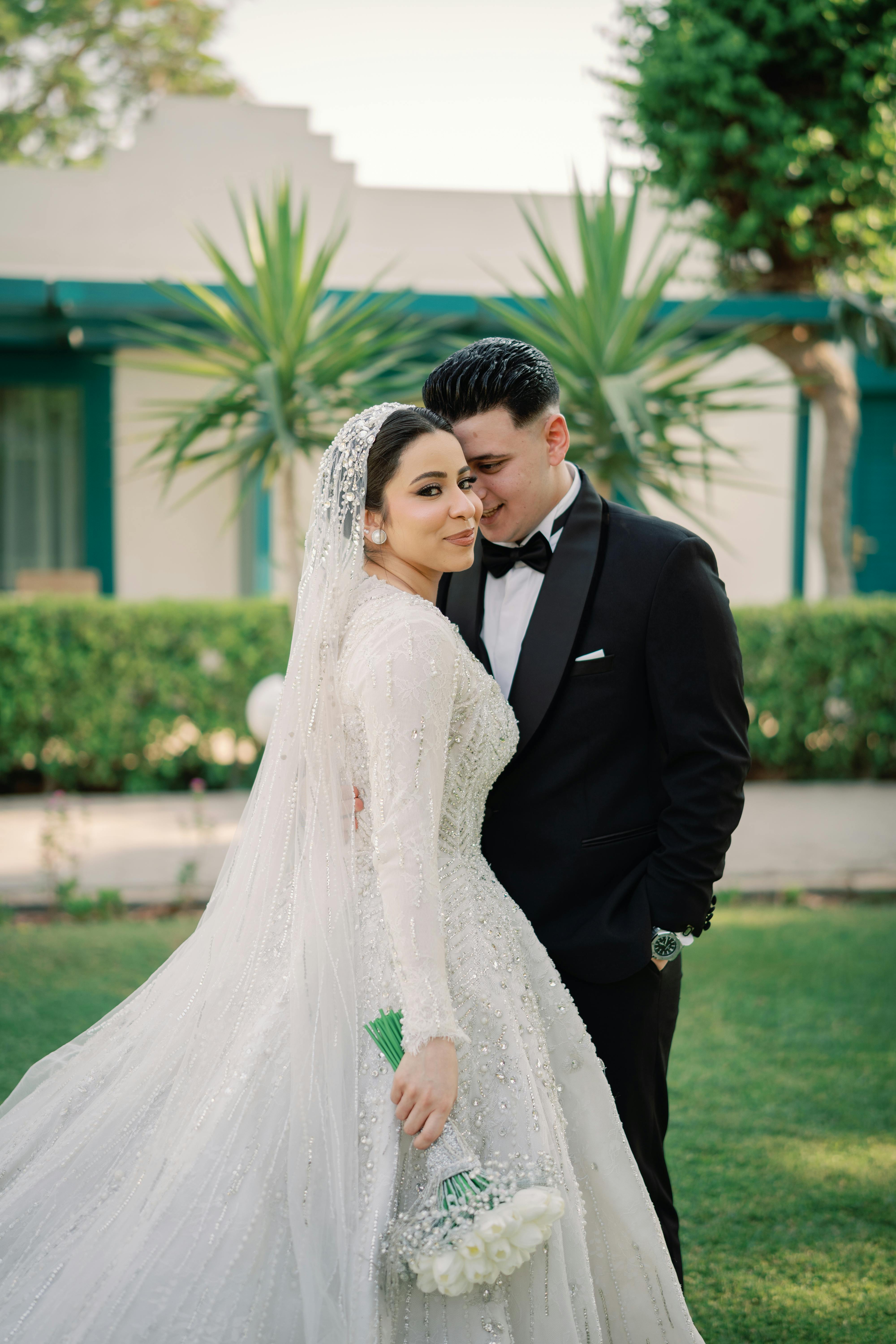 Elegant Outdoor Wedding Portrait at Sunset · Free Stock Photo