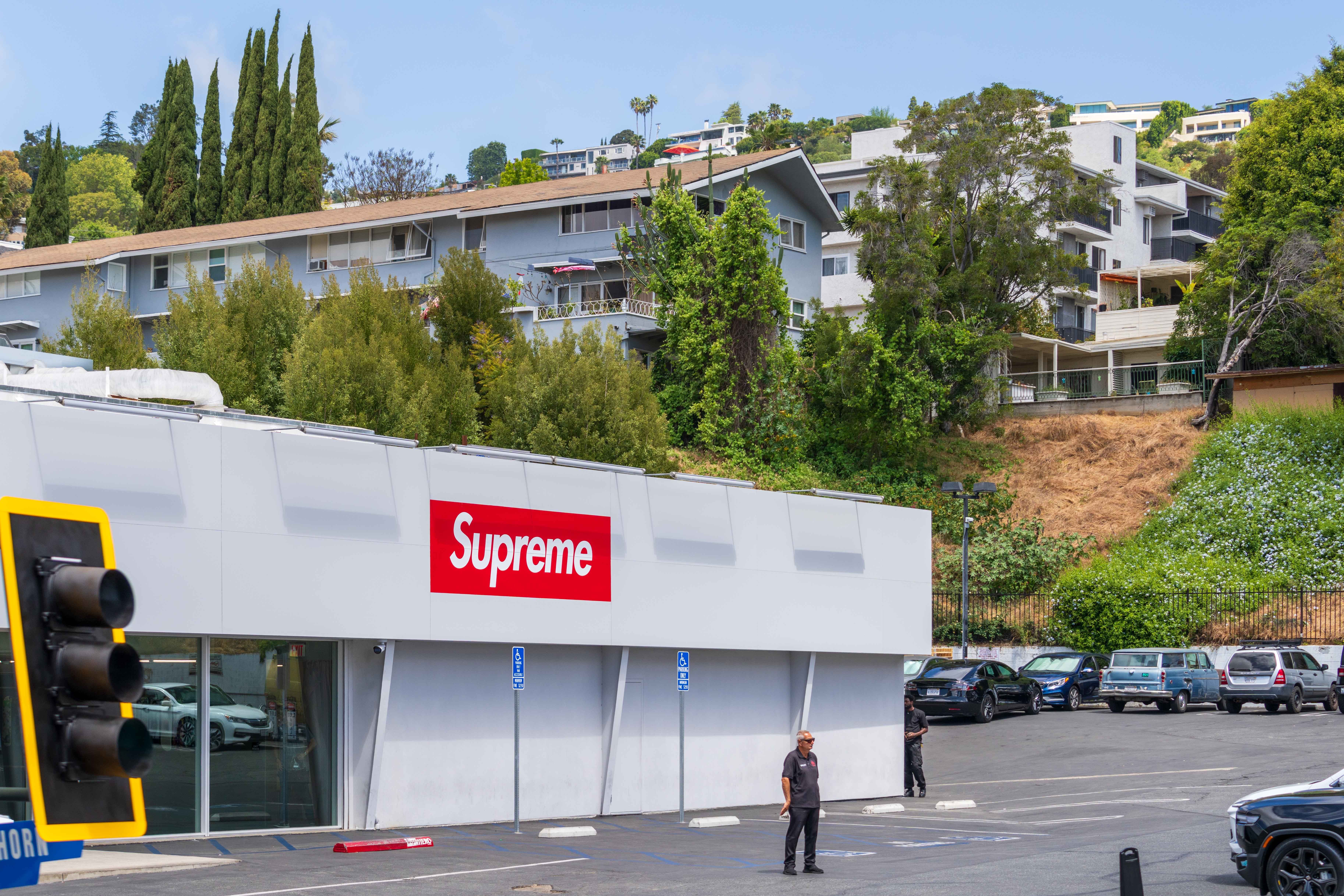 Supreme Store in West Hollywood with Scenic Hillside · Free Stock Photo