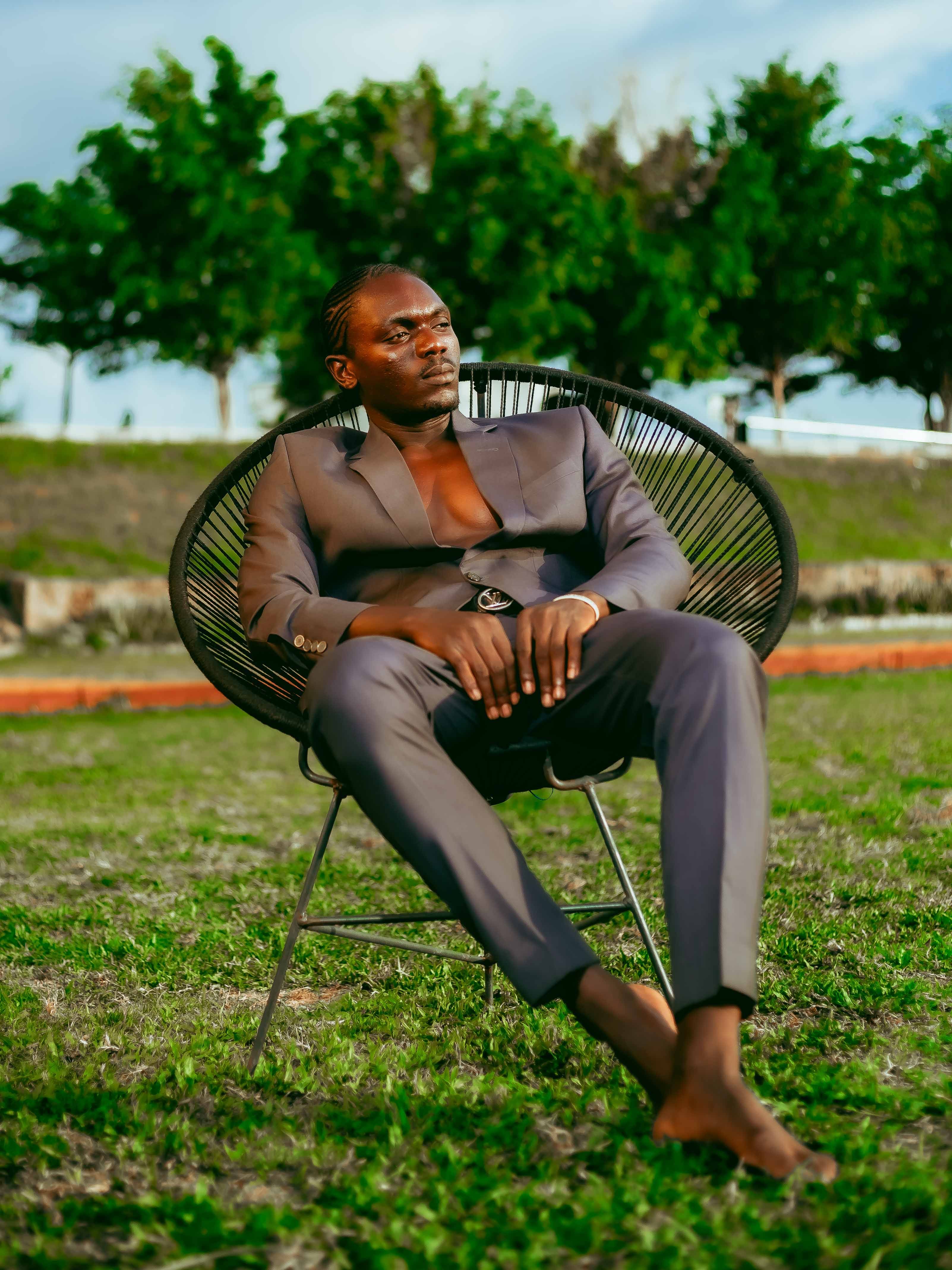 Relaxed Man in Stylish Suit Outdoors · Free Stock Photo