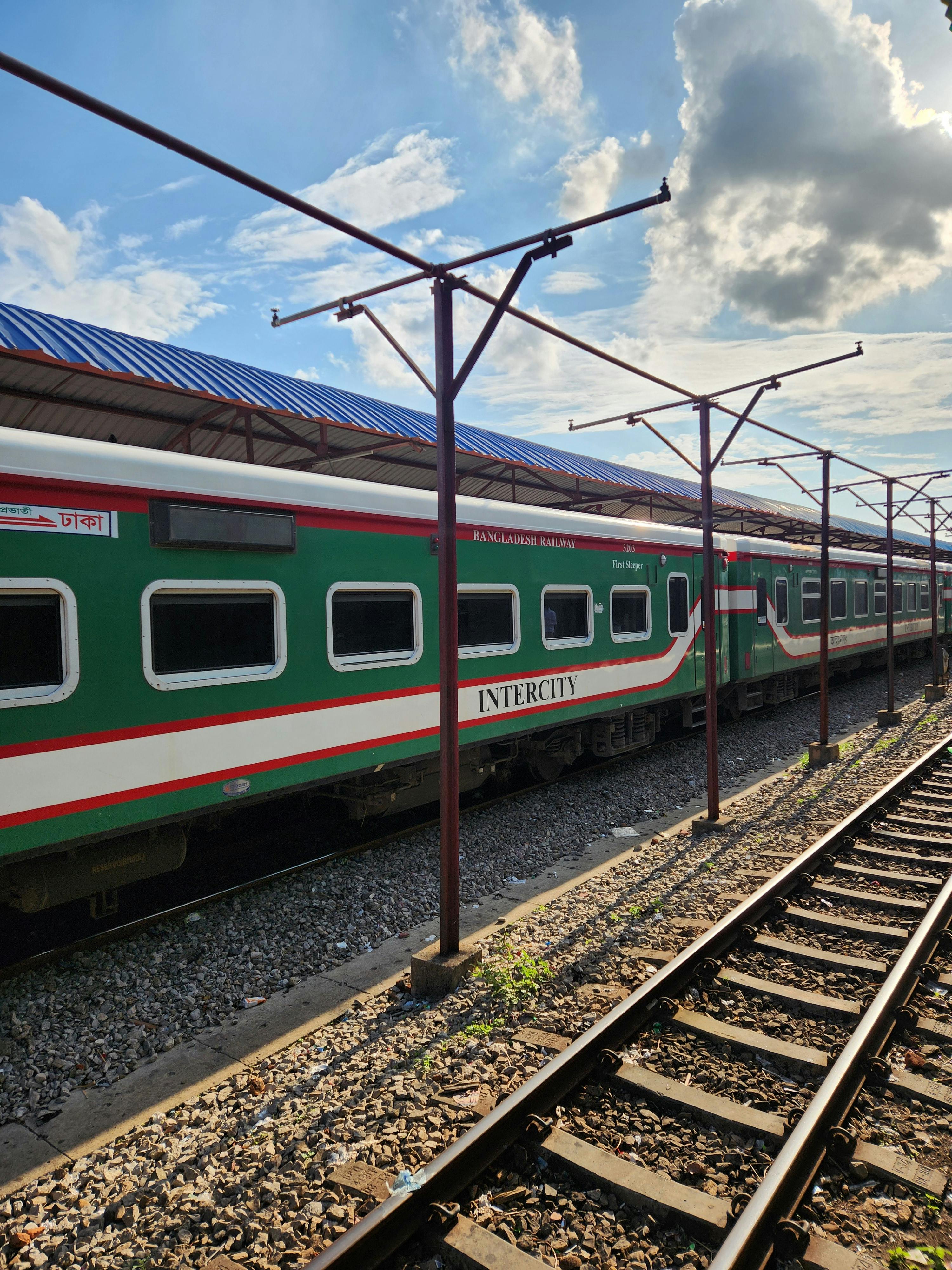 Green and Red Intercity Train at Station · Free Stock Photo