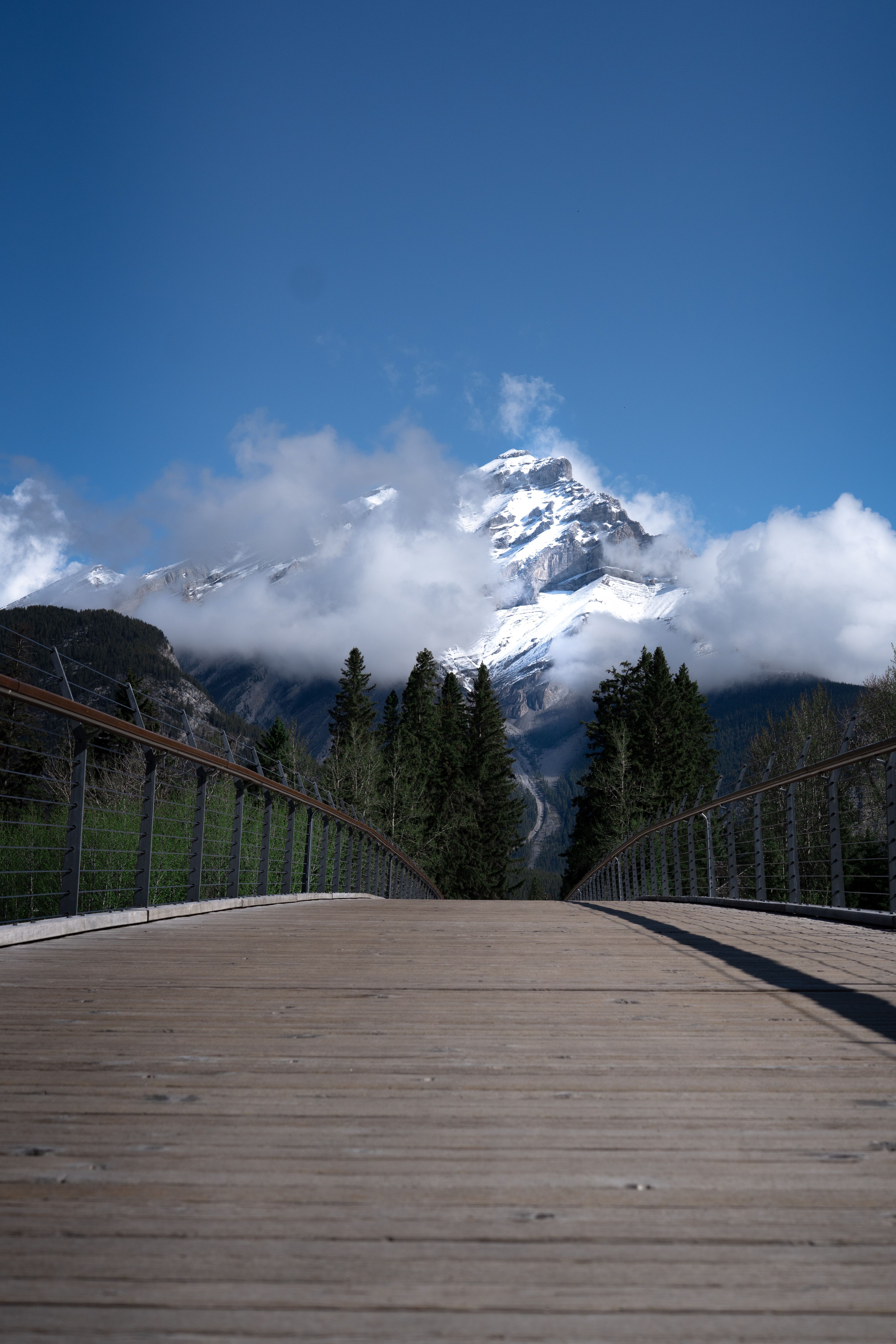 Scenic View of Banff National Park Bridge and Mountains · Free Stock Photo