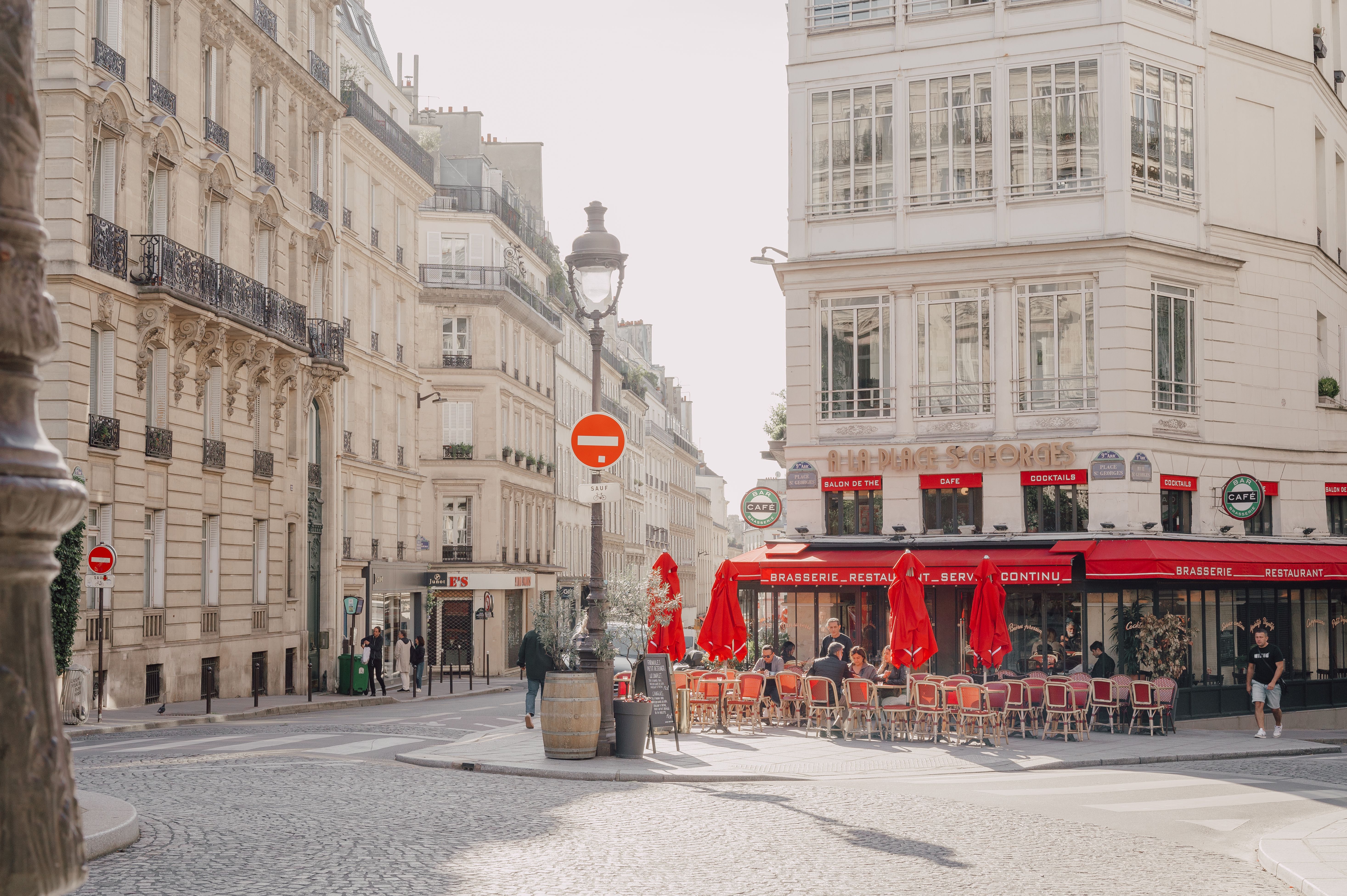 Charming Parisian Street Corner Cafe in Daylight · Free Stock Photo