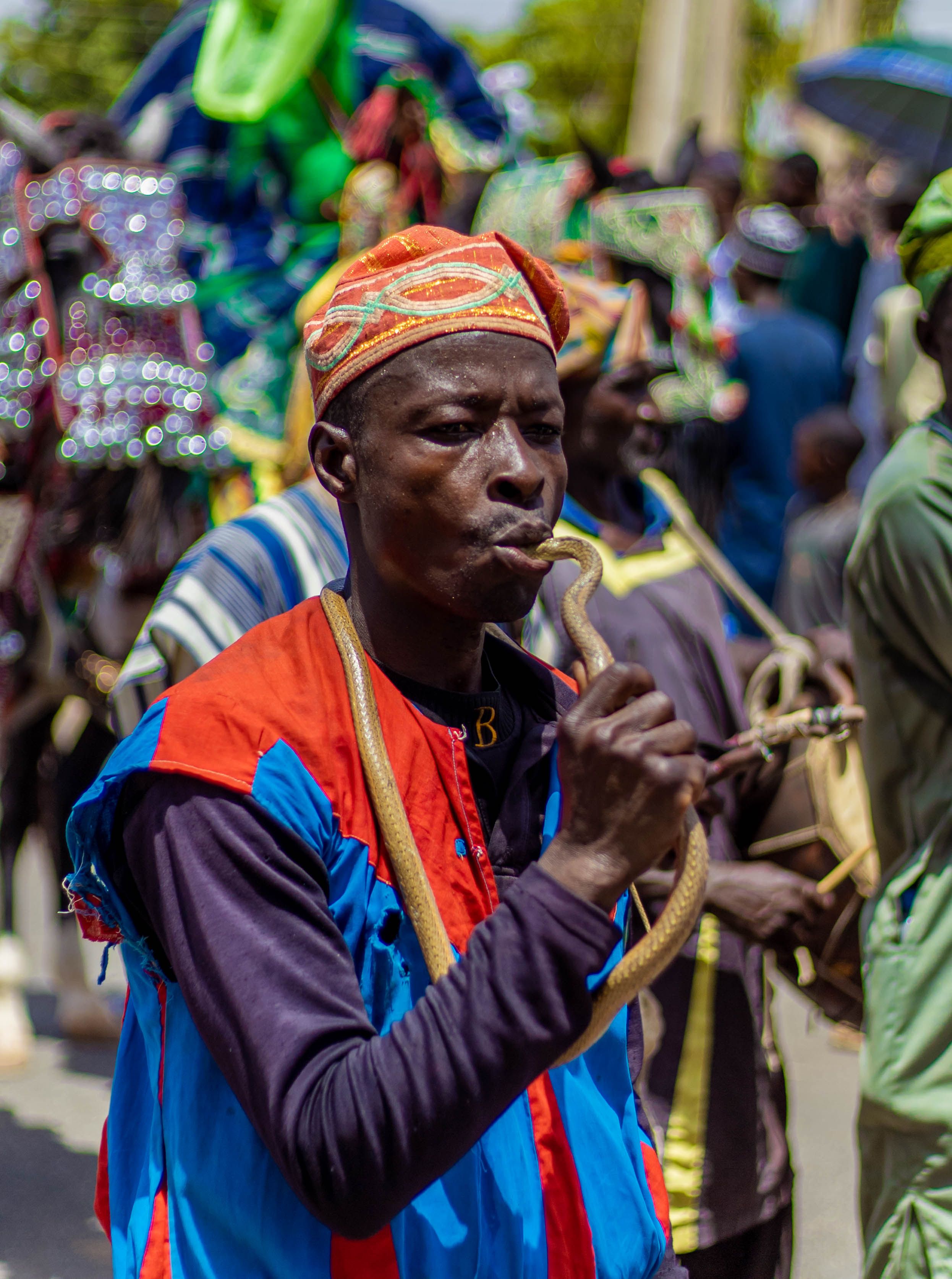 Traditional Festival Performer Playing Flute Outdoors · Free Stock Photo