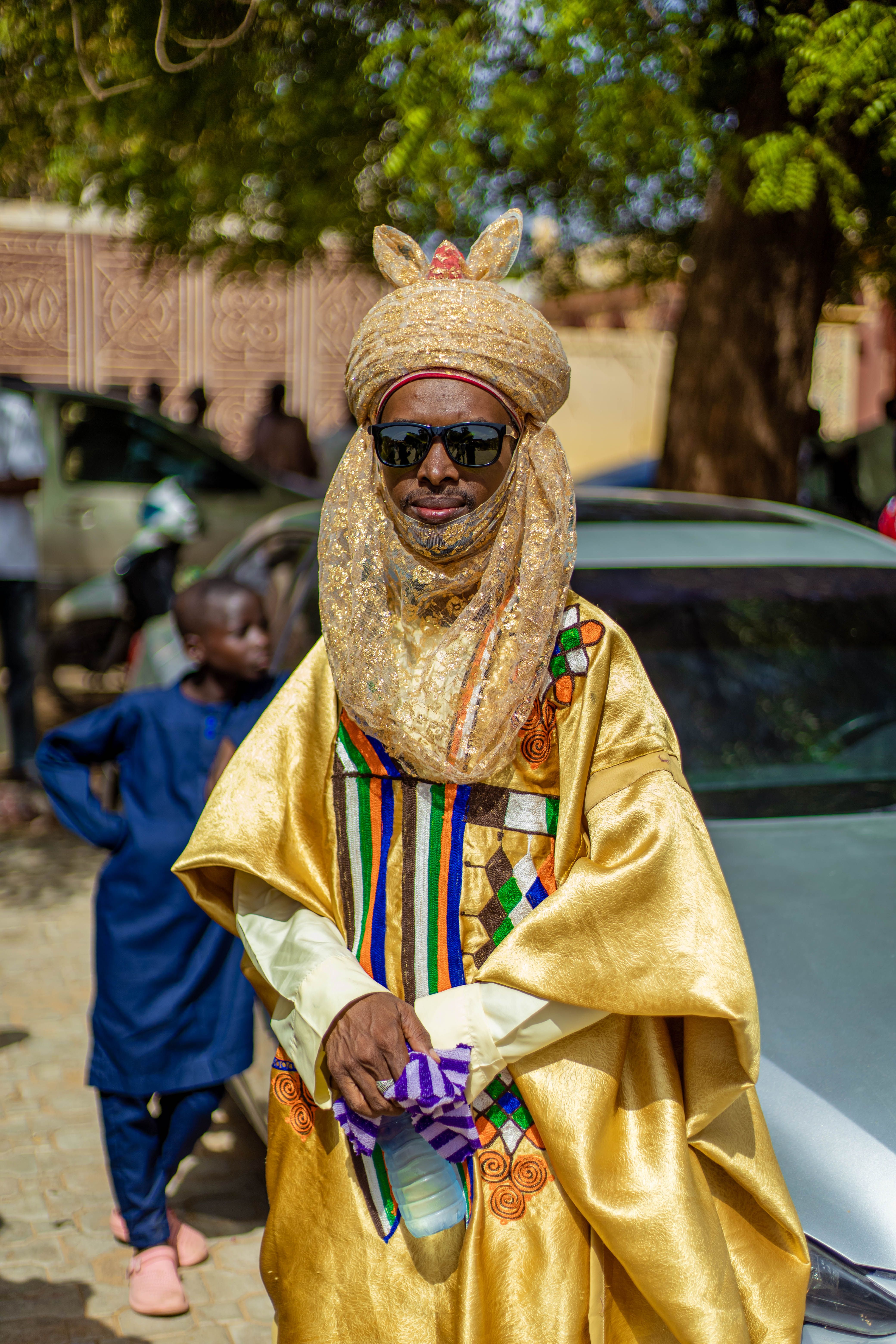 Colorful Traditional African Garb Street Scene · Free Stock Photo