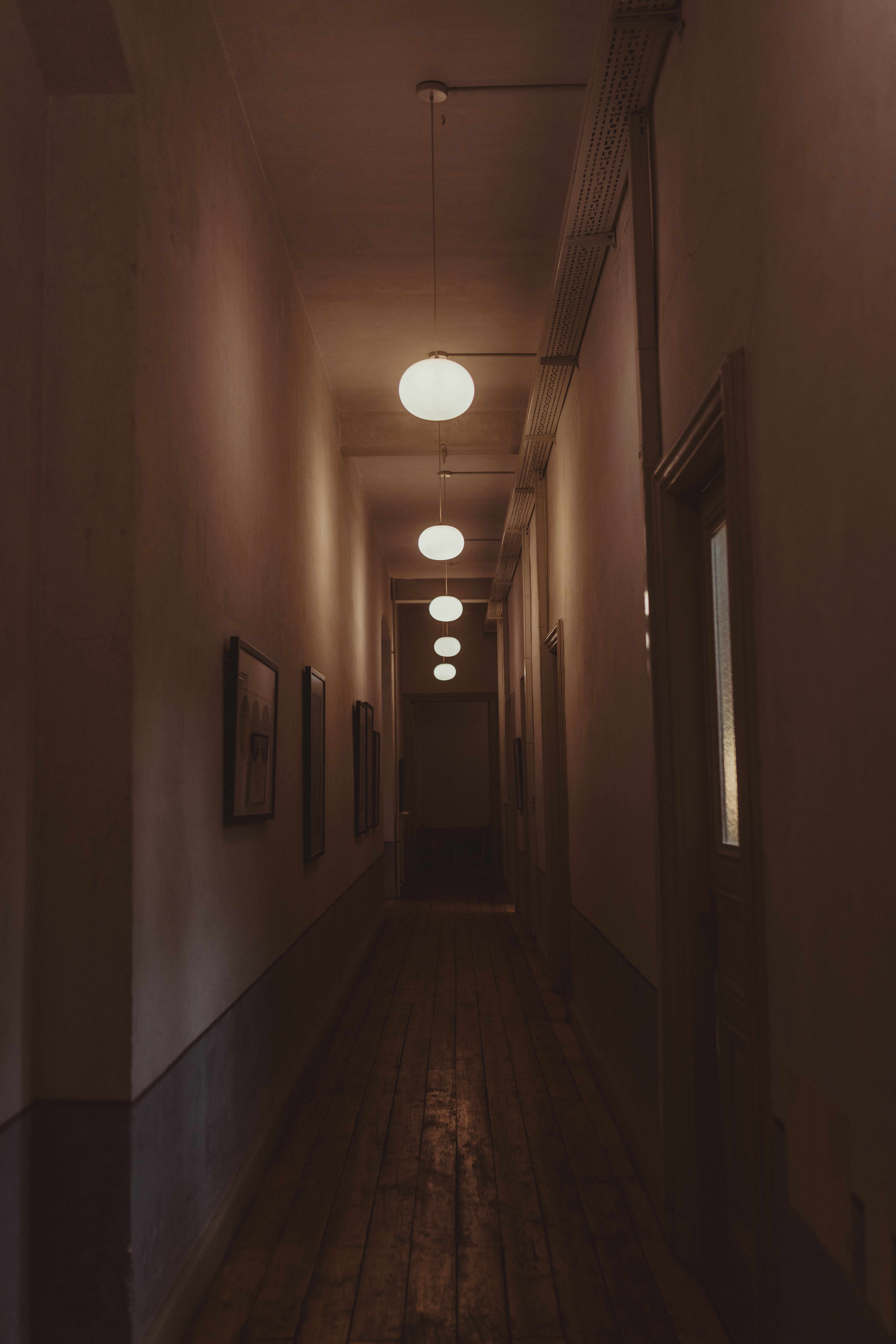 Moody Vintage Hallway with Hanging Lamps · Free Stock Photo