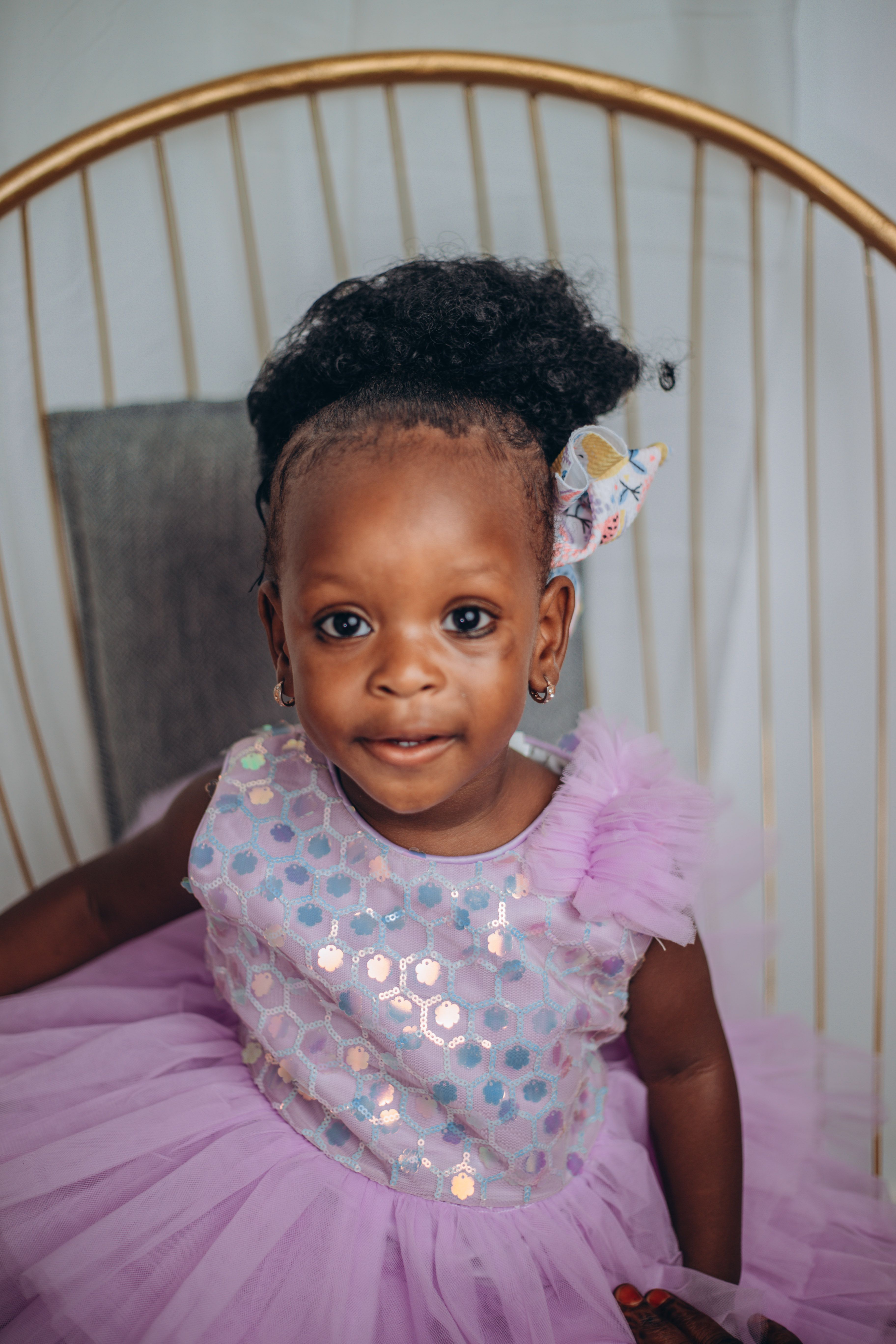 Adorable Child in Purple Dress Smiling · Free Stock Photo