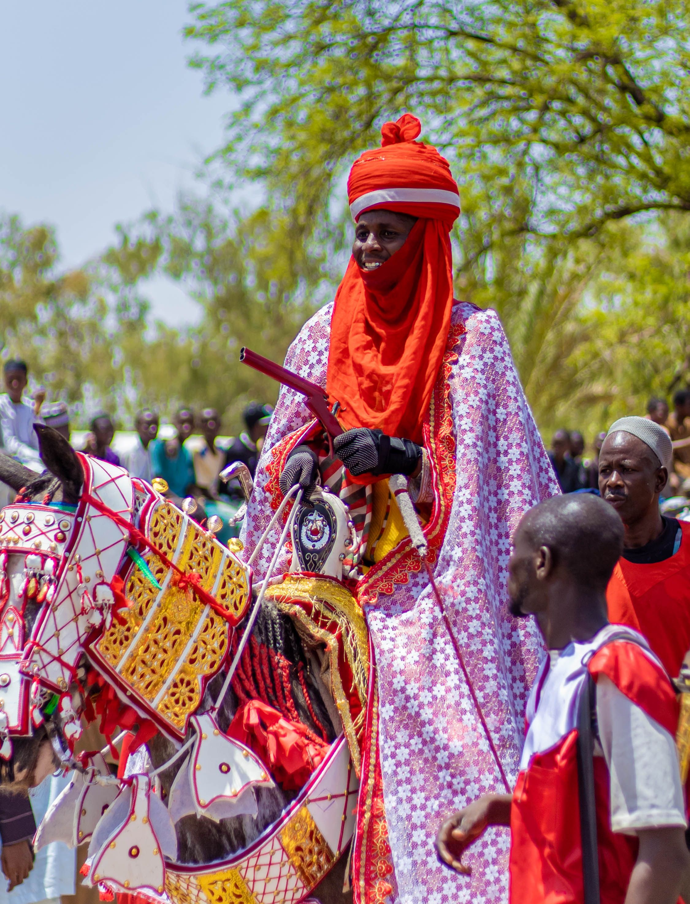 Traditional Festival with Colorful Attire and Parade · Free Stock Photo