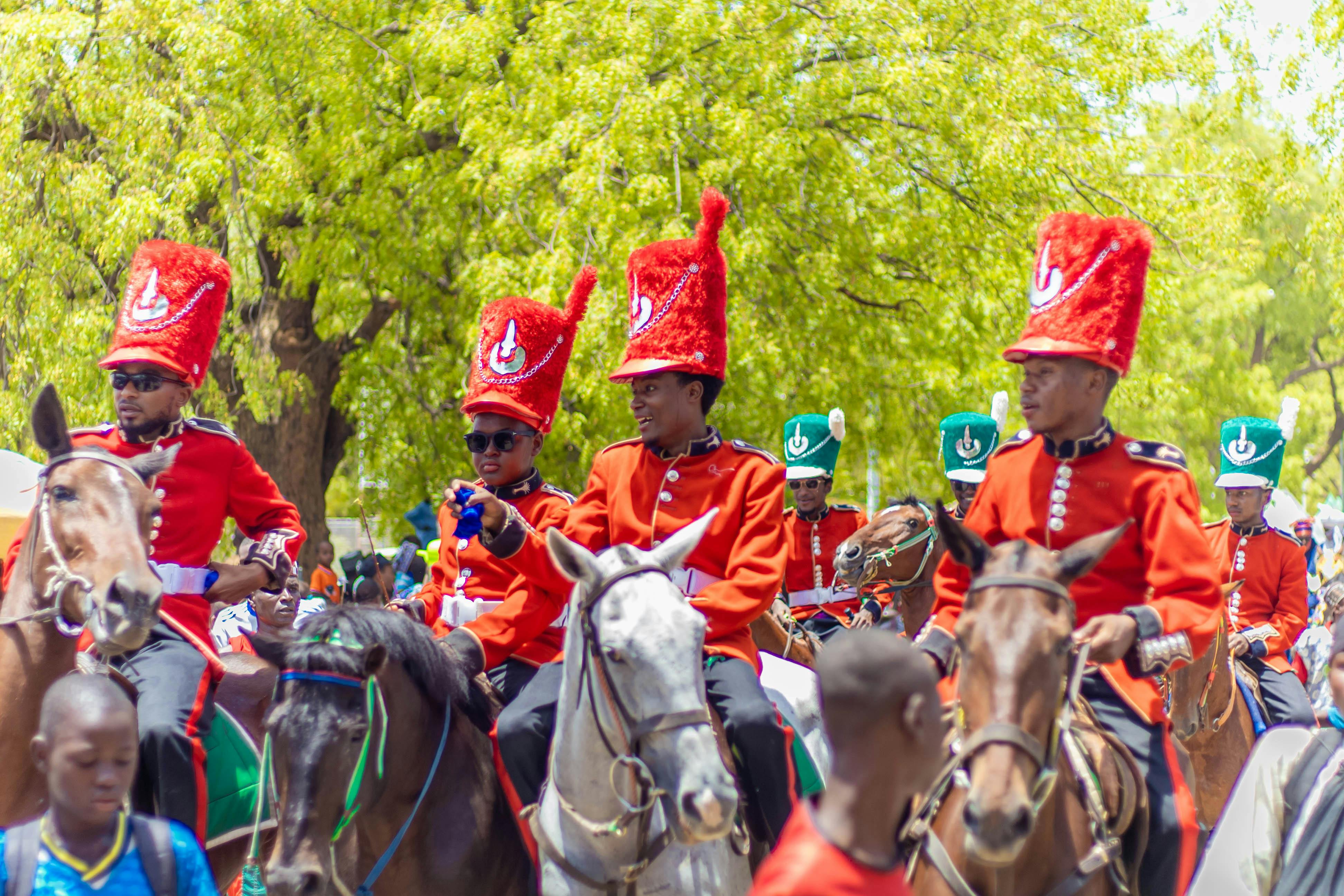 Vibrant Parade with Horse-Riding Marching Band · Free Stock Photo