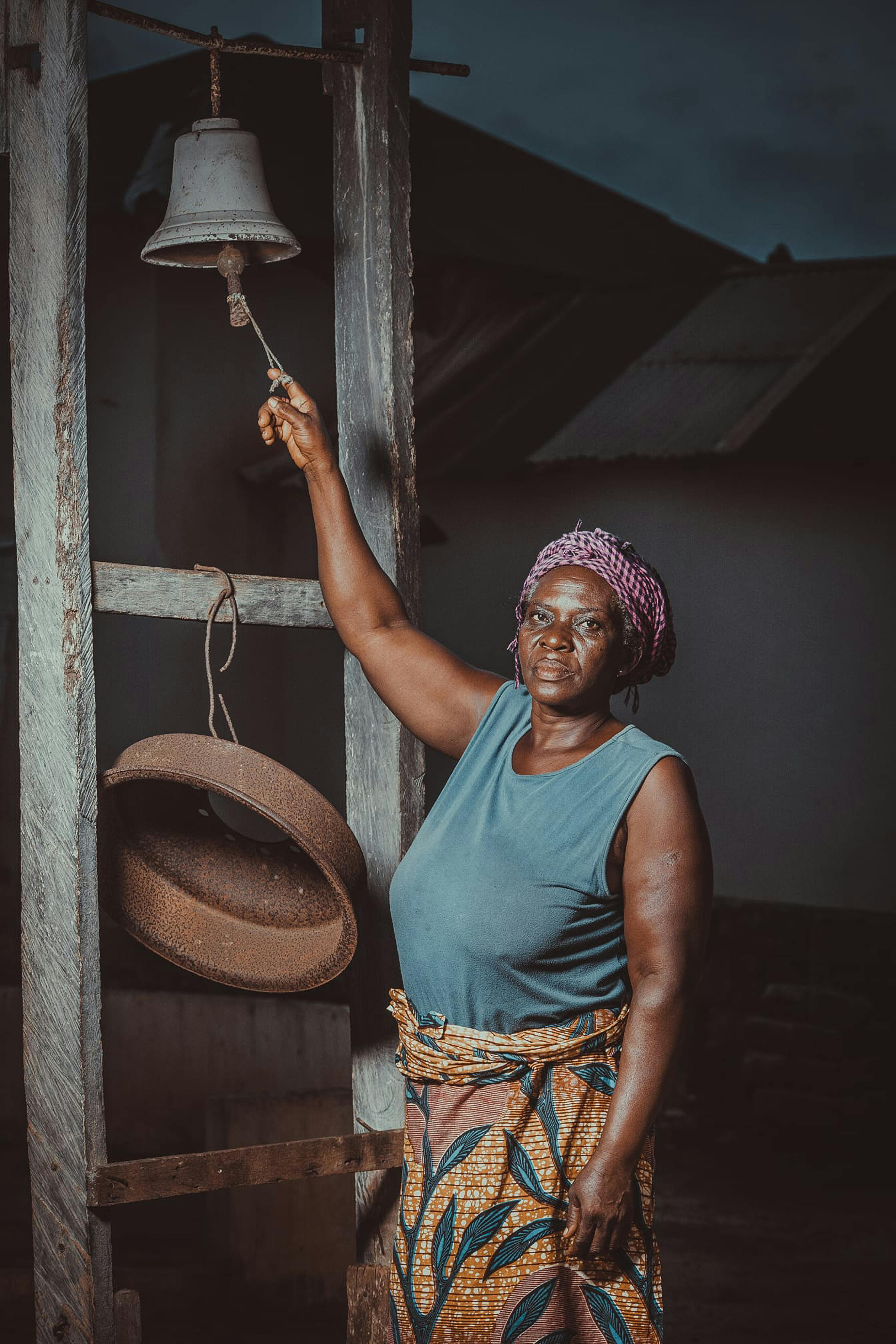 Traditional African Woman Ringing Bell in Ghana · Free Stock Photo
