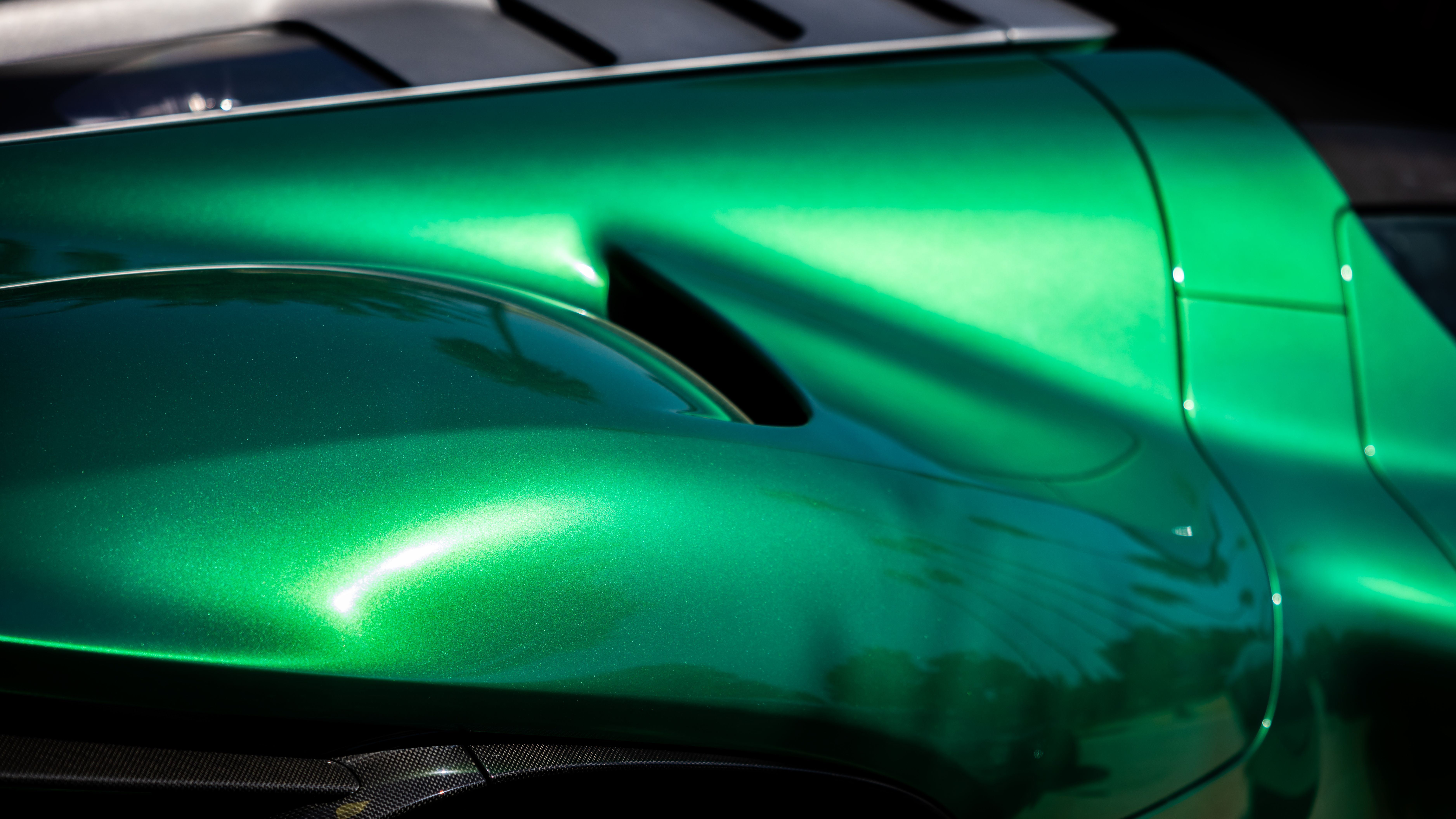 Close-up of Green Sports Car Exterior Detail · Free Stock Photo