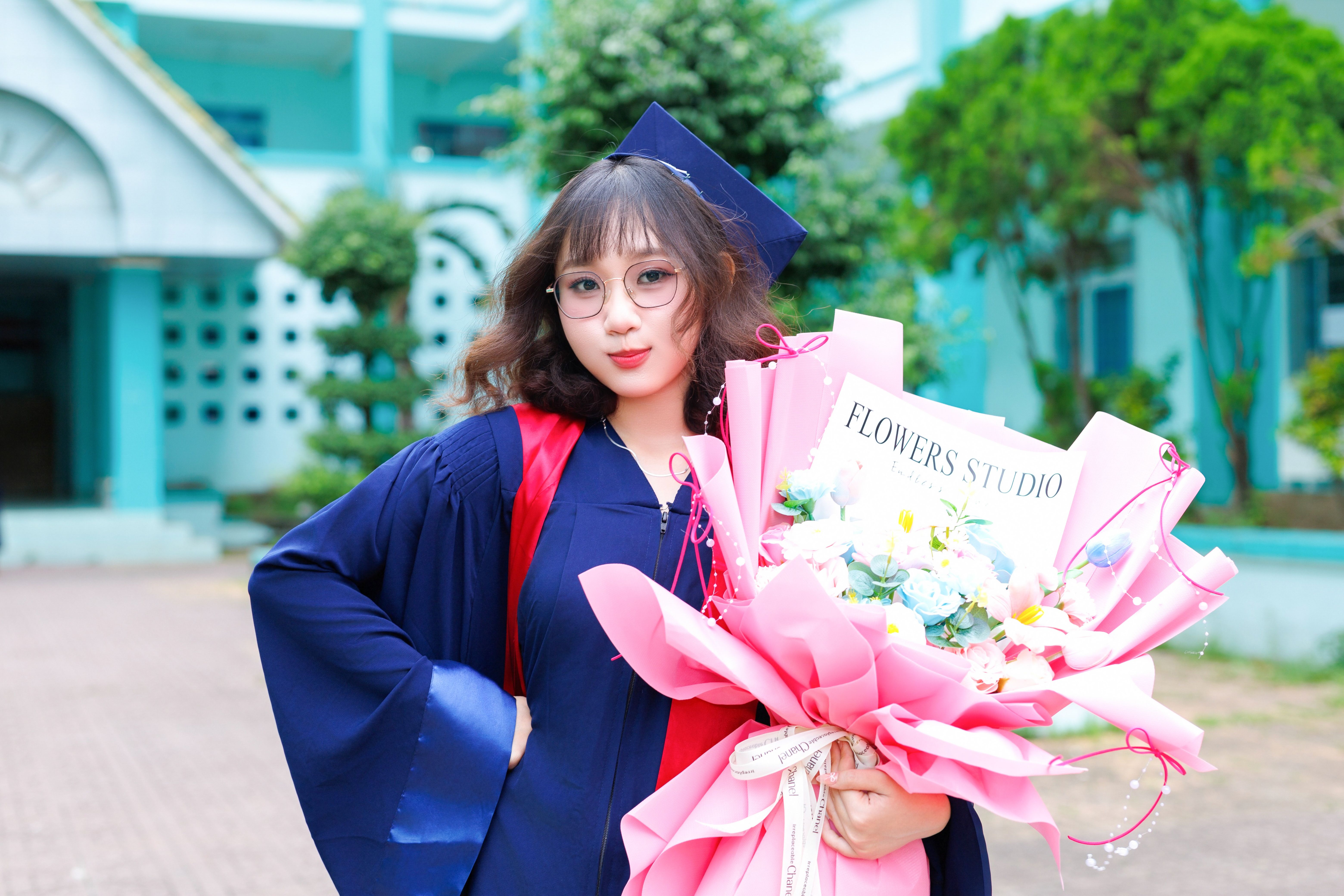 Graduation Day Celebration with Flowers · Free Stock Photo