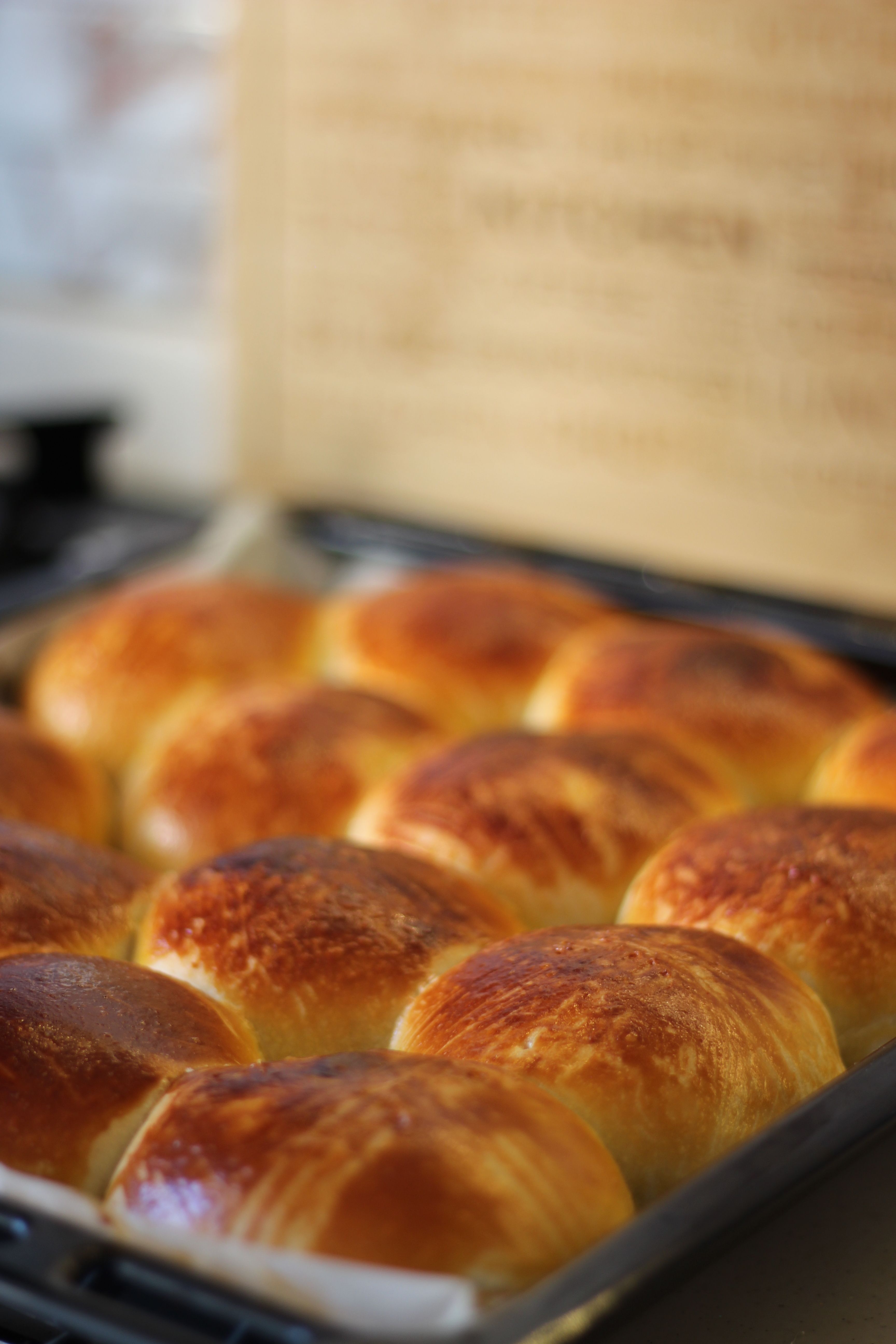 Freshly Baked Golden Bread Rolls in Kitchen · Free Stock Photo