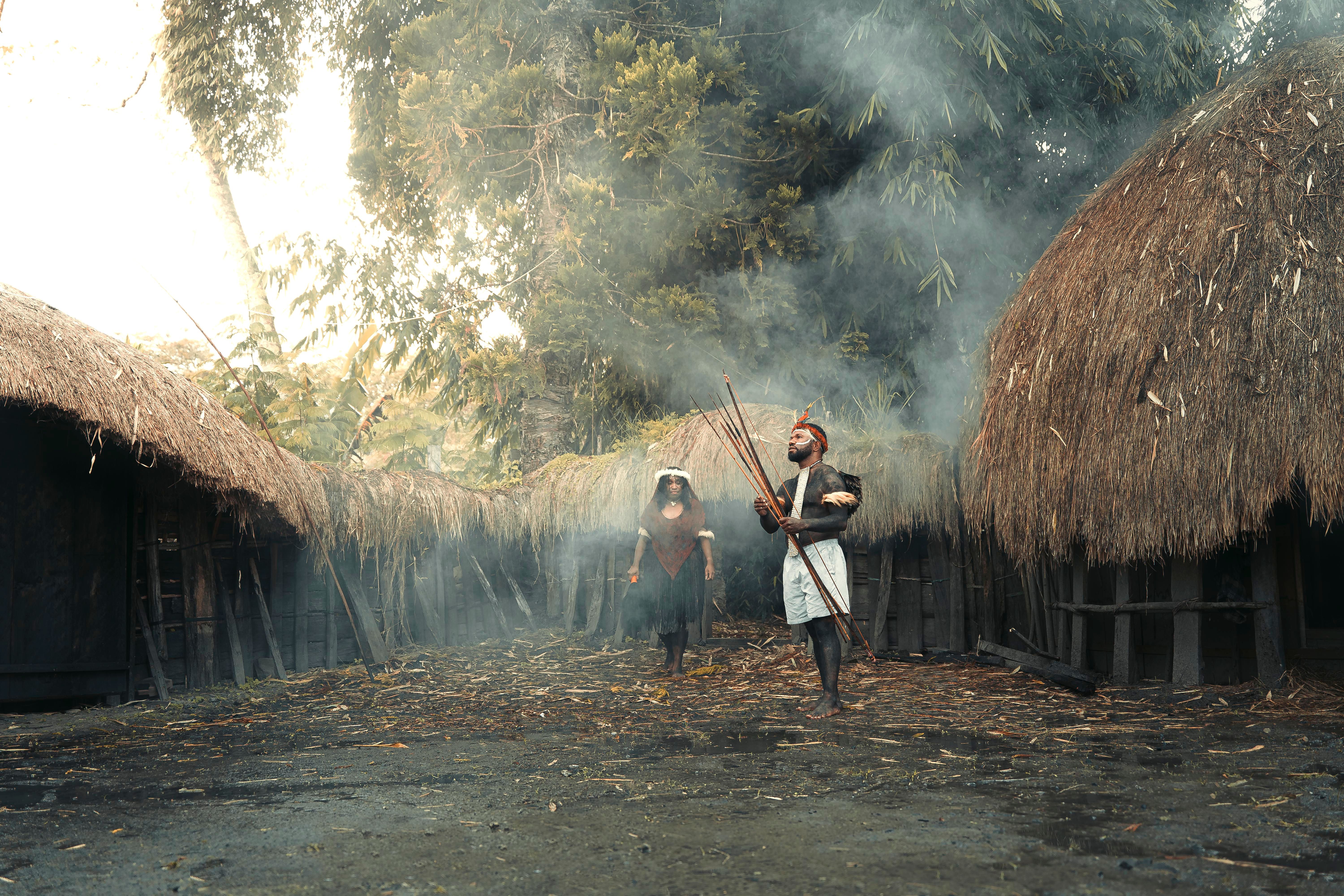 Traditional Indigenous Village Scene with Tribal People · Free Stock Photo