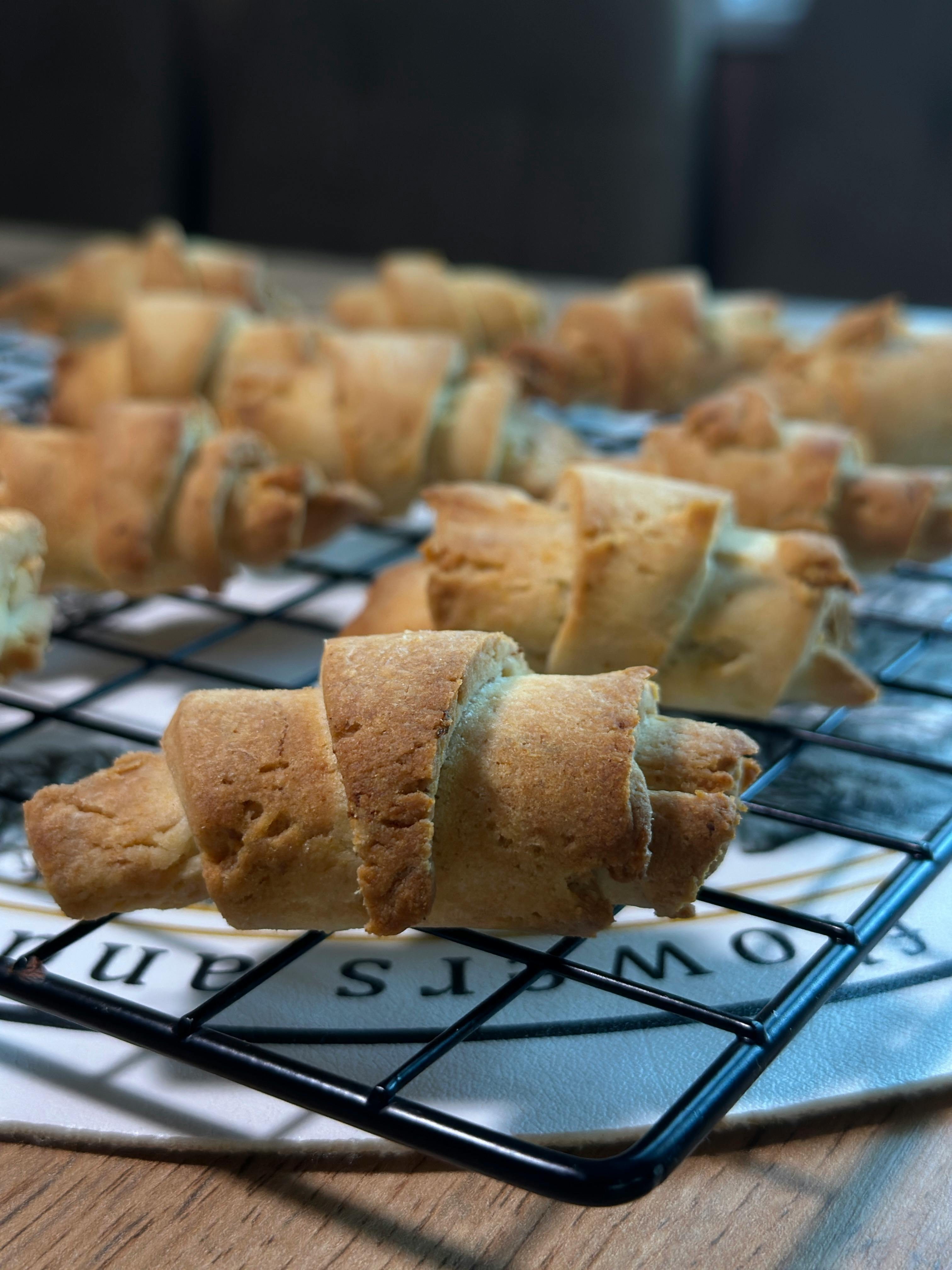 Freshly Baked Croissants Cooling on Rack · Free Stock Photo