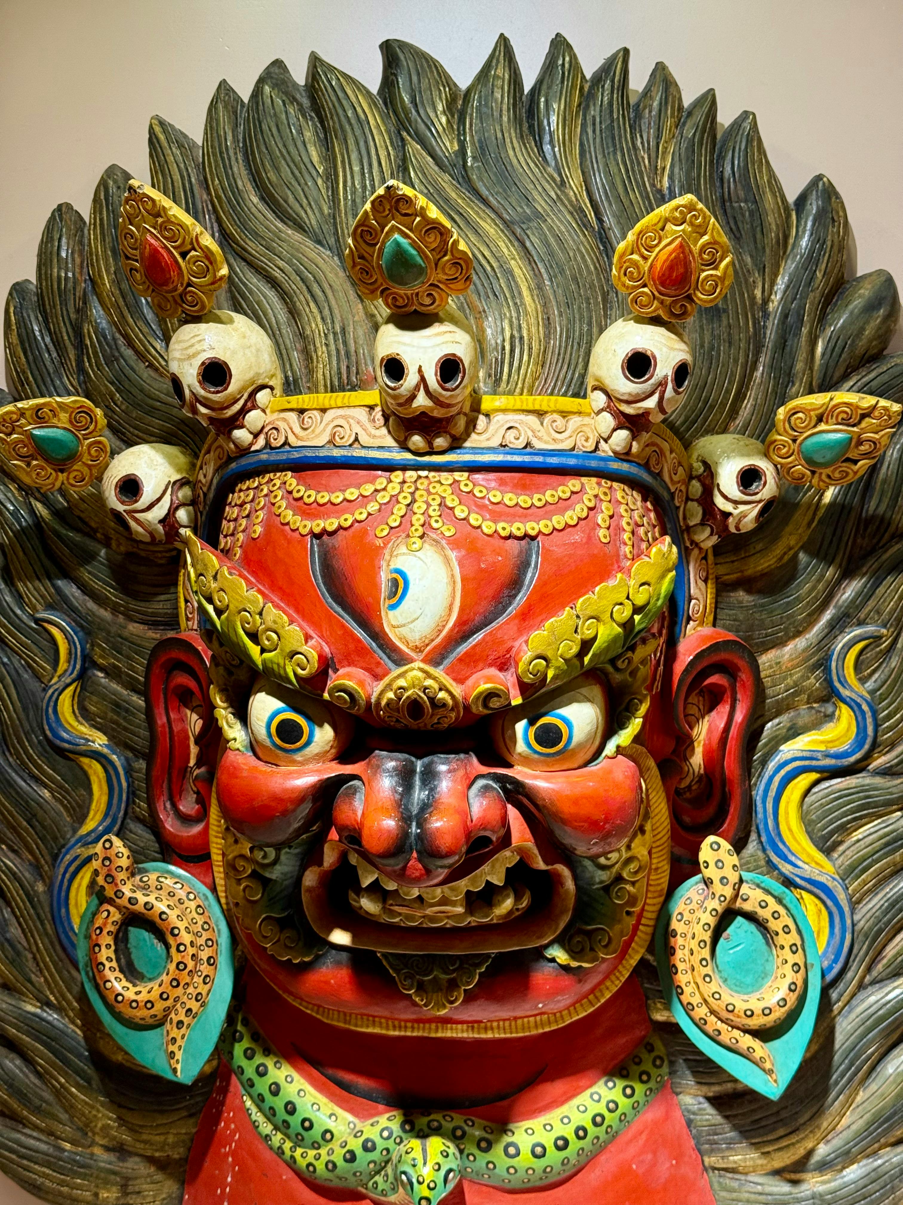 Vibrant Tibetan Mask with Intricate Detailing · Free Stock Photo