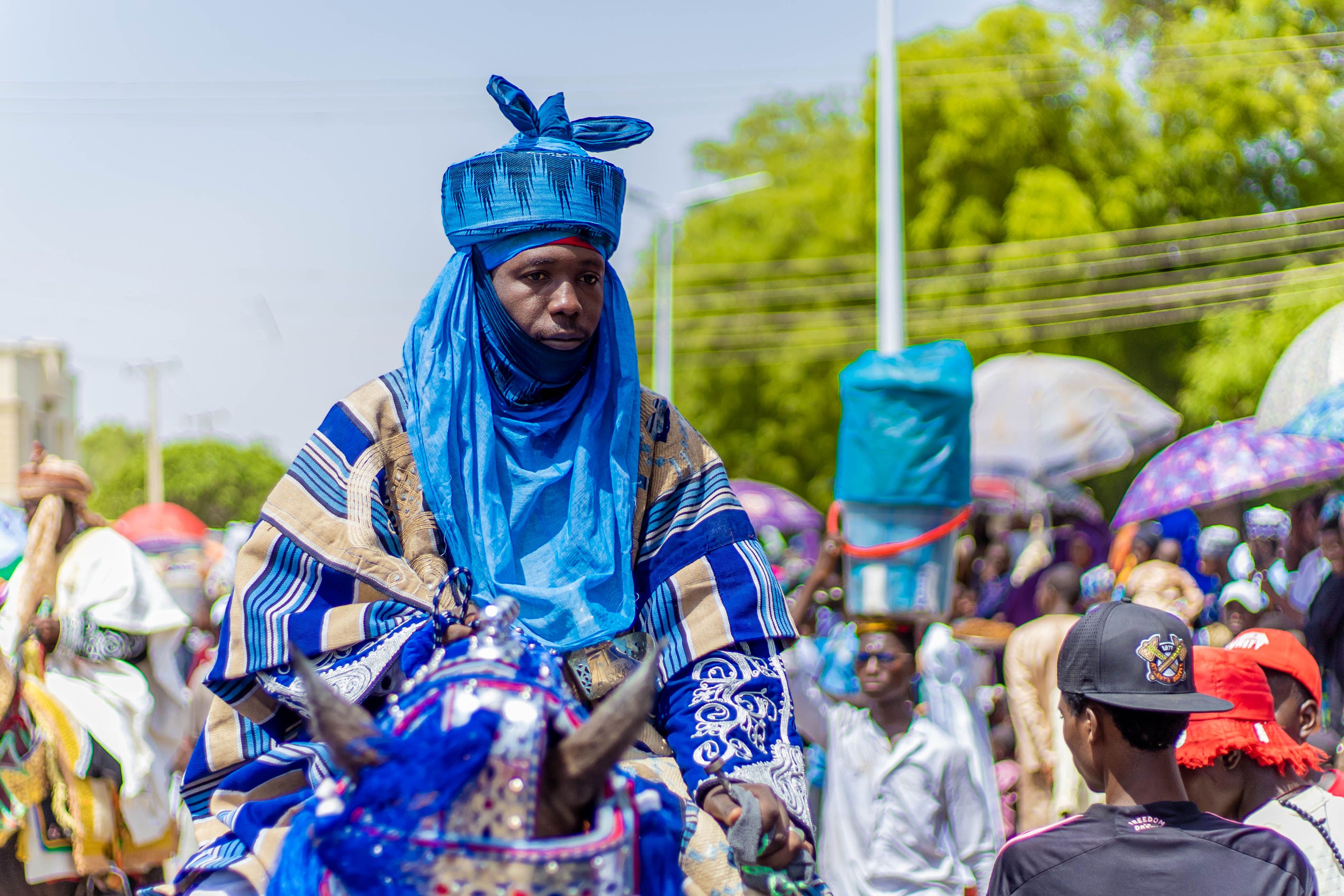 Cultural Parade with Traditional Robes and Horse · Free Stock Photo