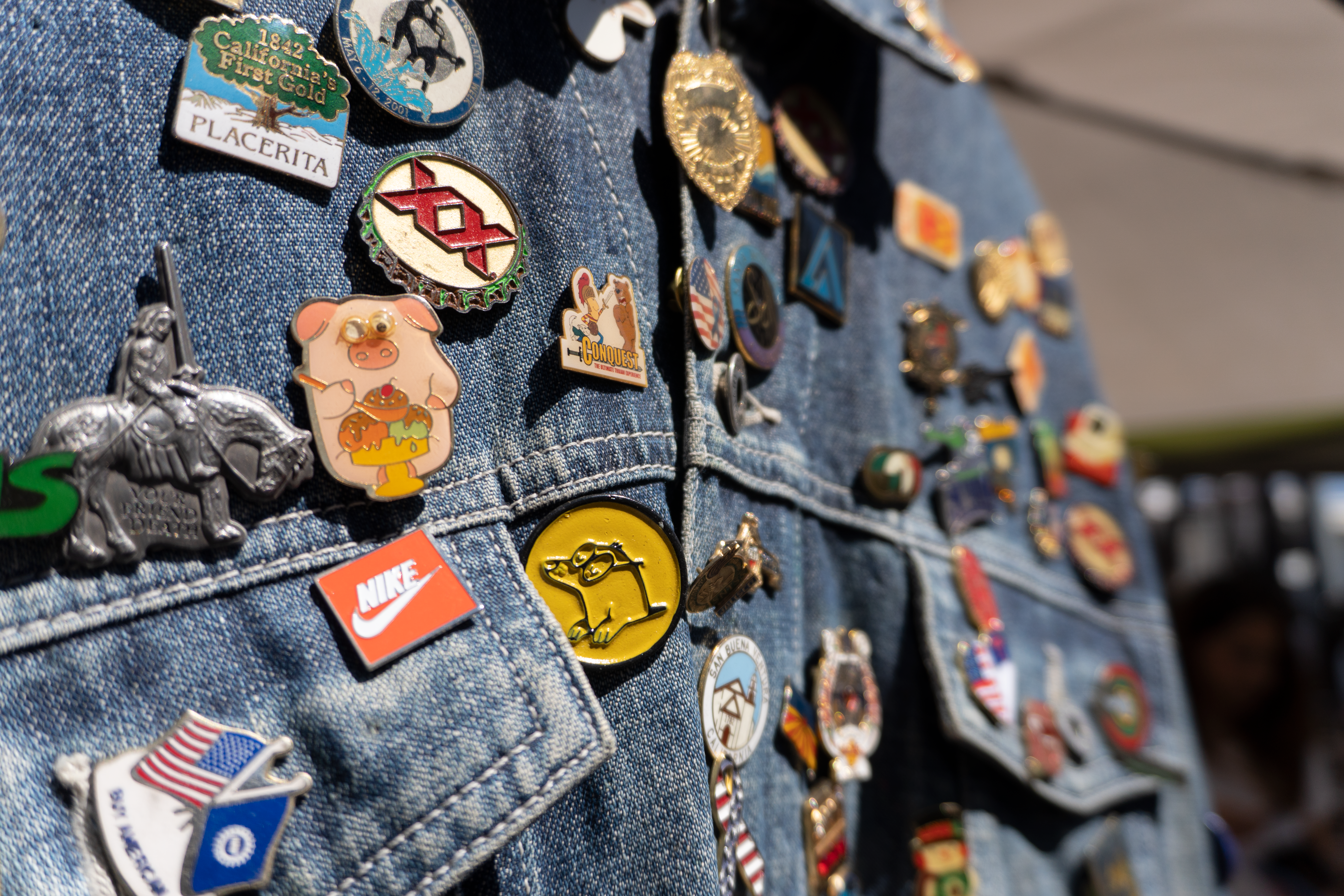 Colorful Pin Collection on Denim Jacket · Free Stock Photo