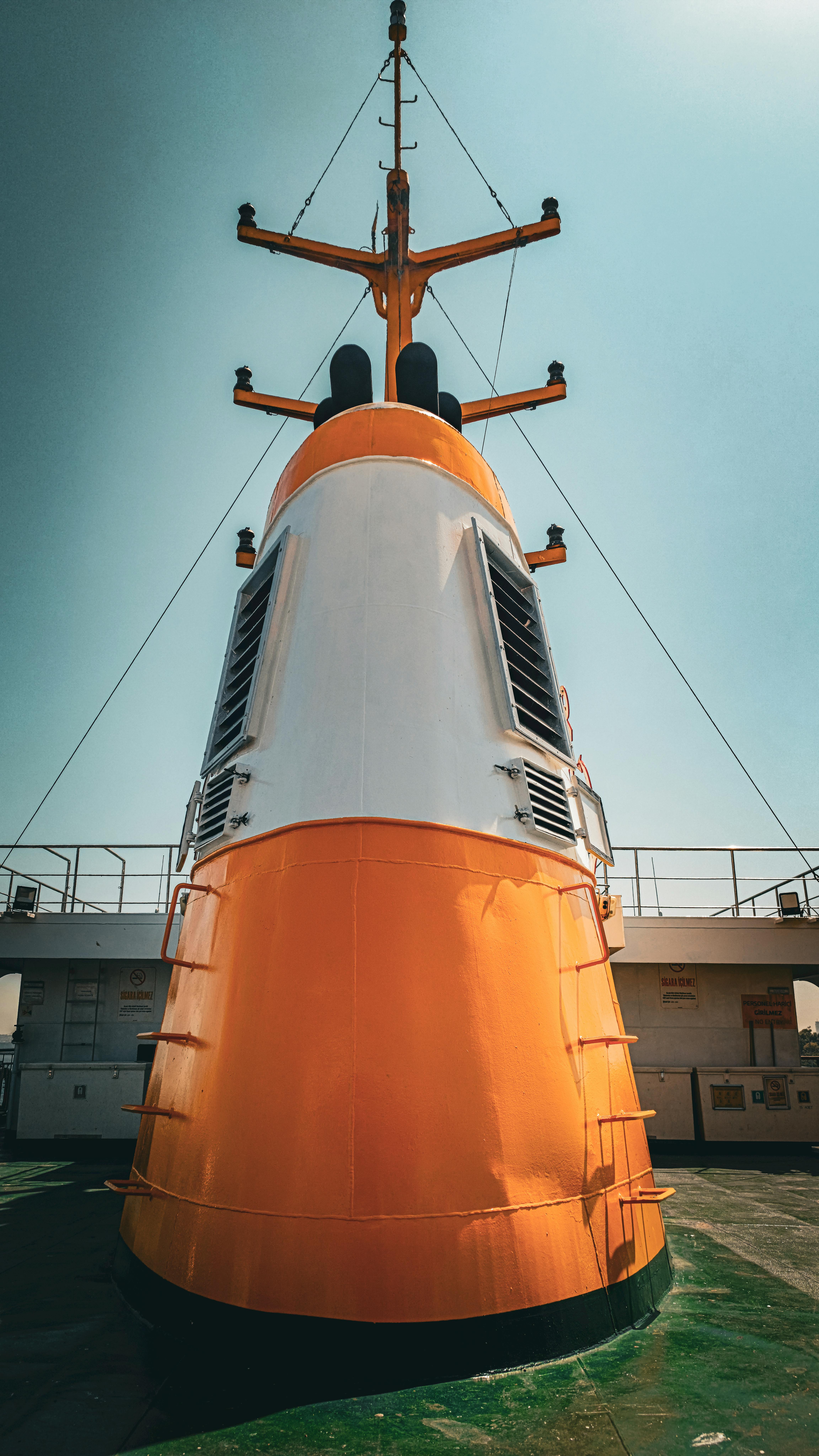 Vibrant Ship Funnel Against Blue Sky · Free Stock Photo