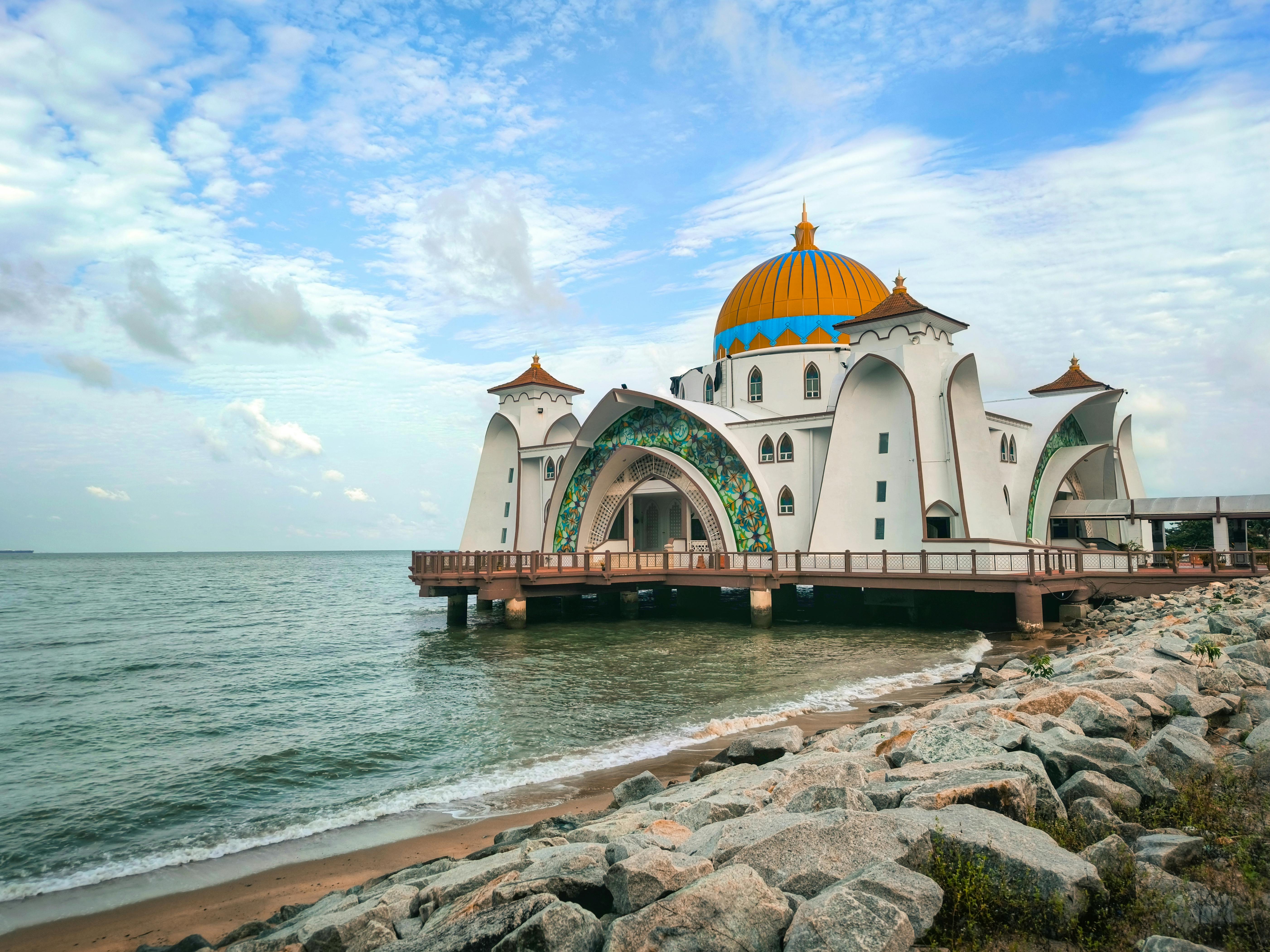 Stunning View of Melaka Straits Mosque by the Sea · Free Stock Photo