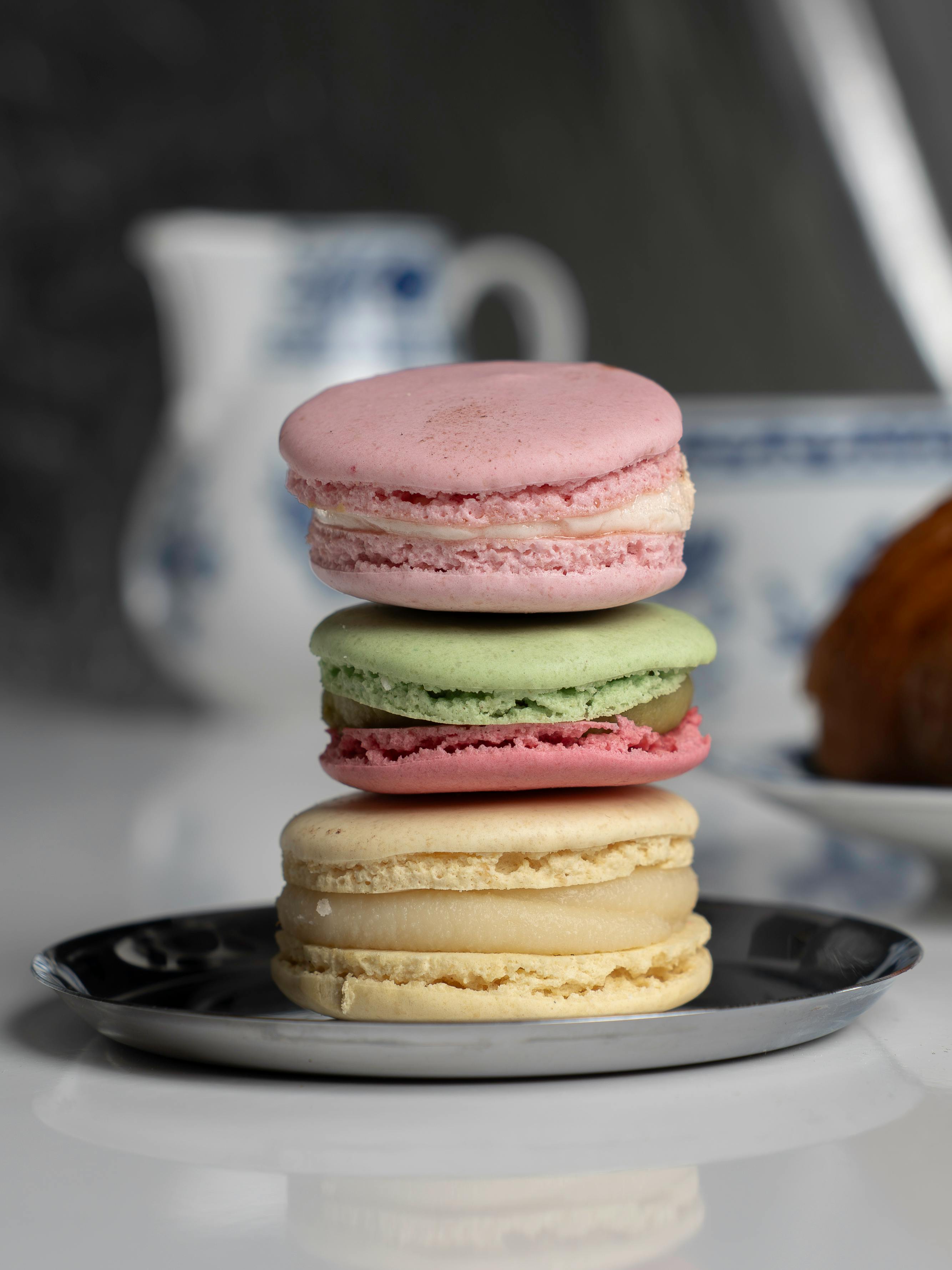 Elegant Stack of Colorful French Macarons · Free Stock Photo