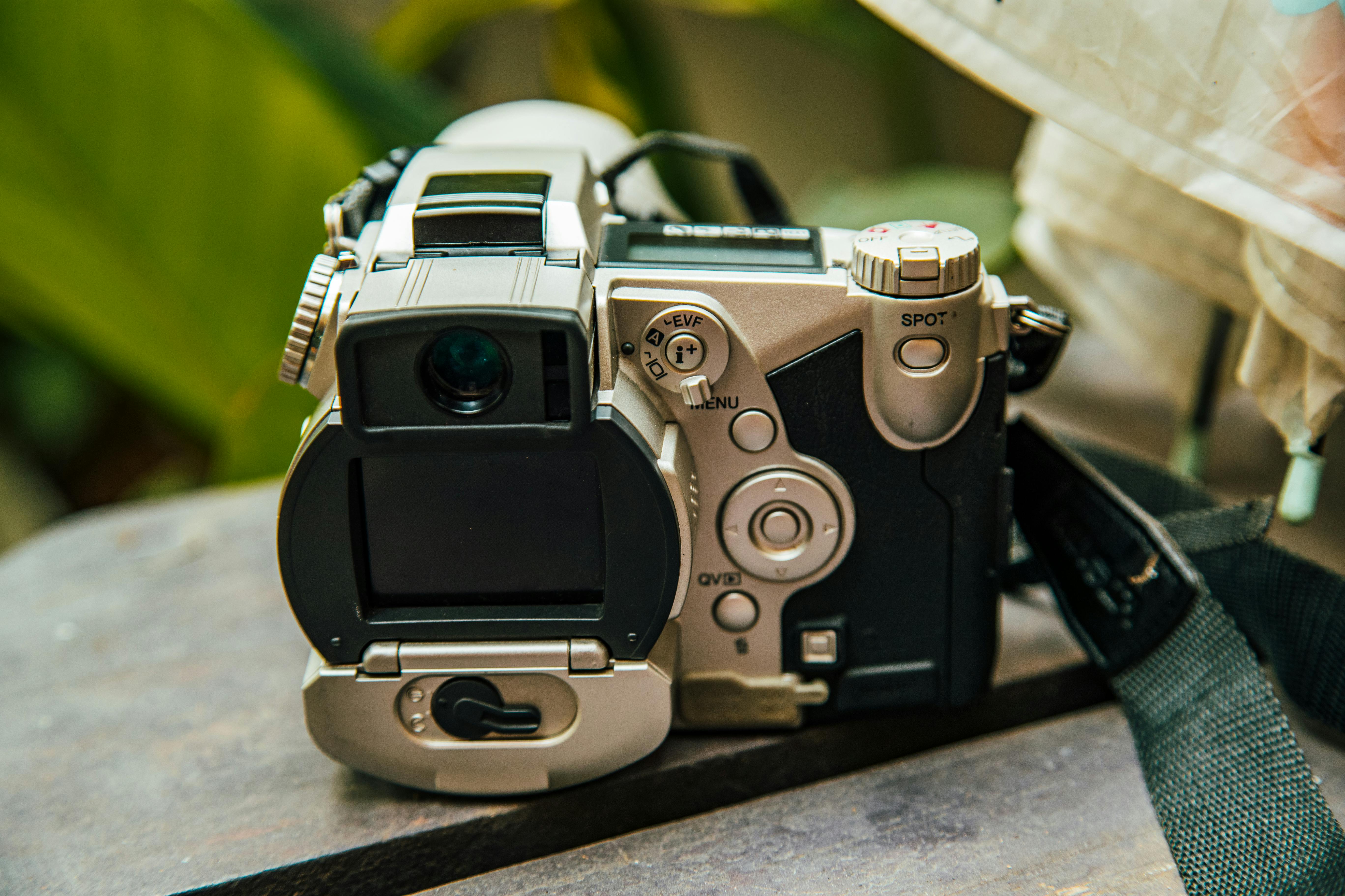 Back View of a Digital Camera on a Table · Free Stock Photo