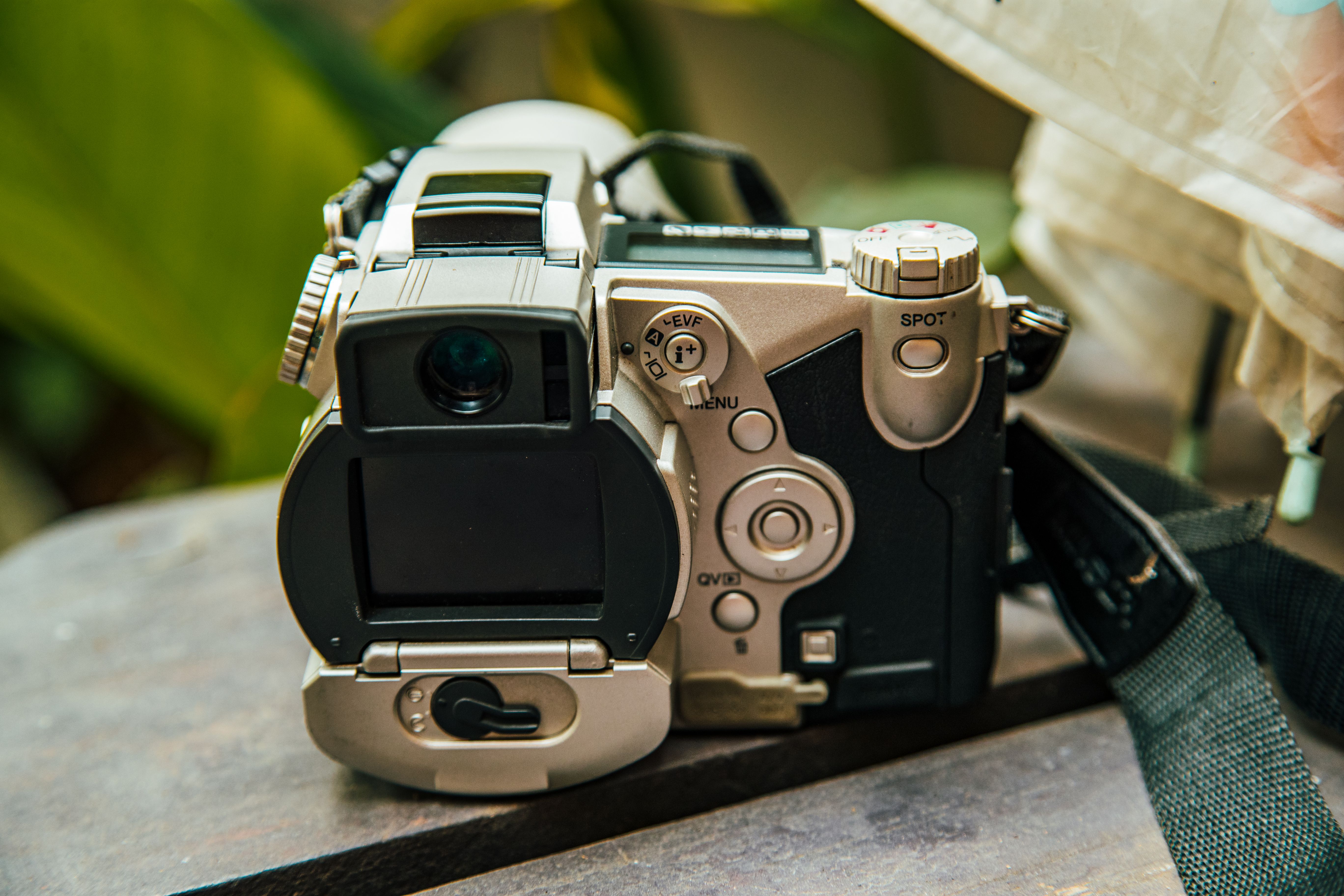 Back View of a Digital Camera on a Table · Free Stock Photo