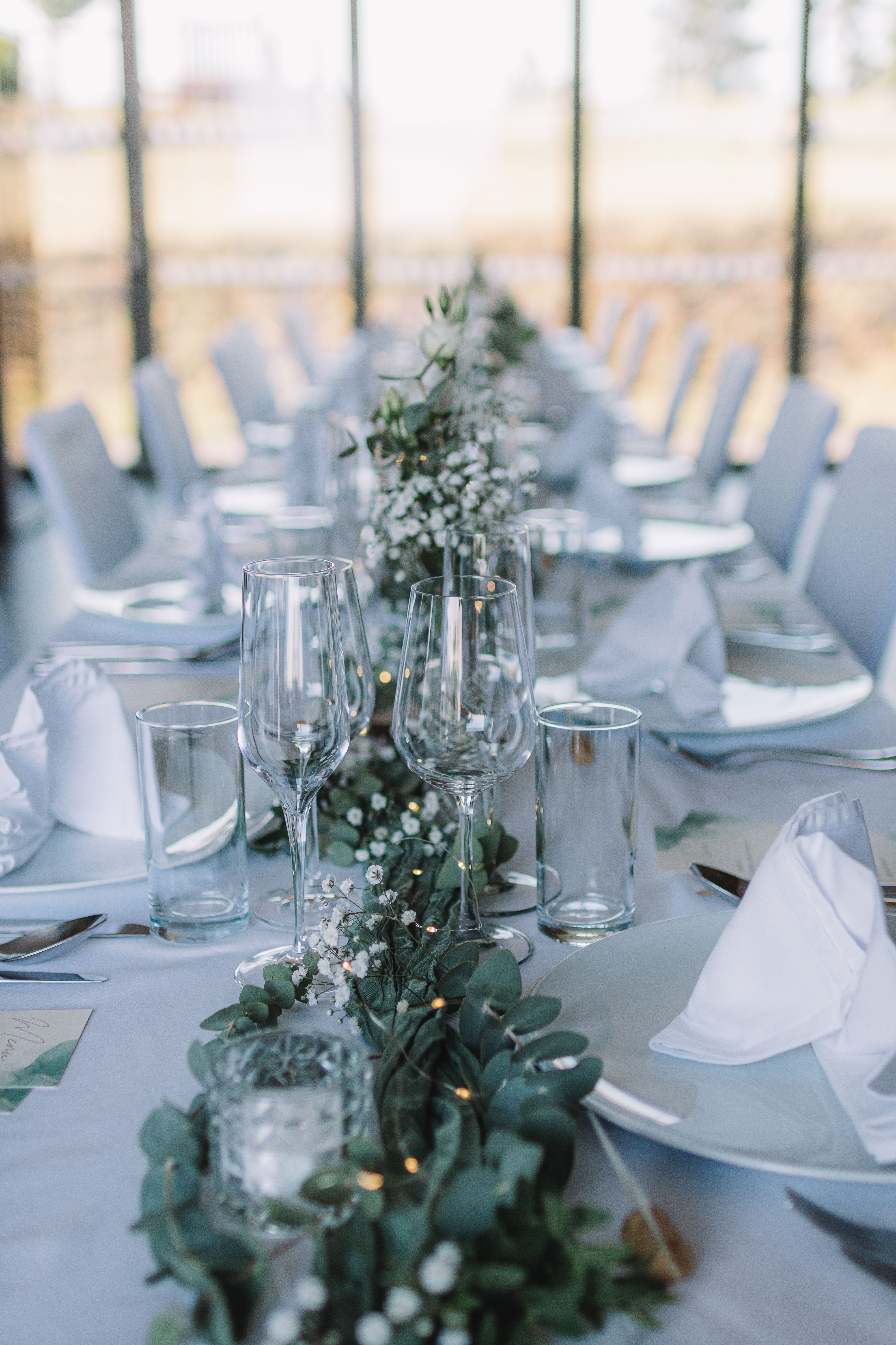 Elegant Table Setting with Greenery Decoration · Free Stock Photo