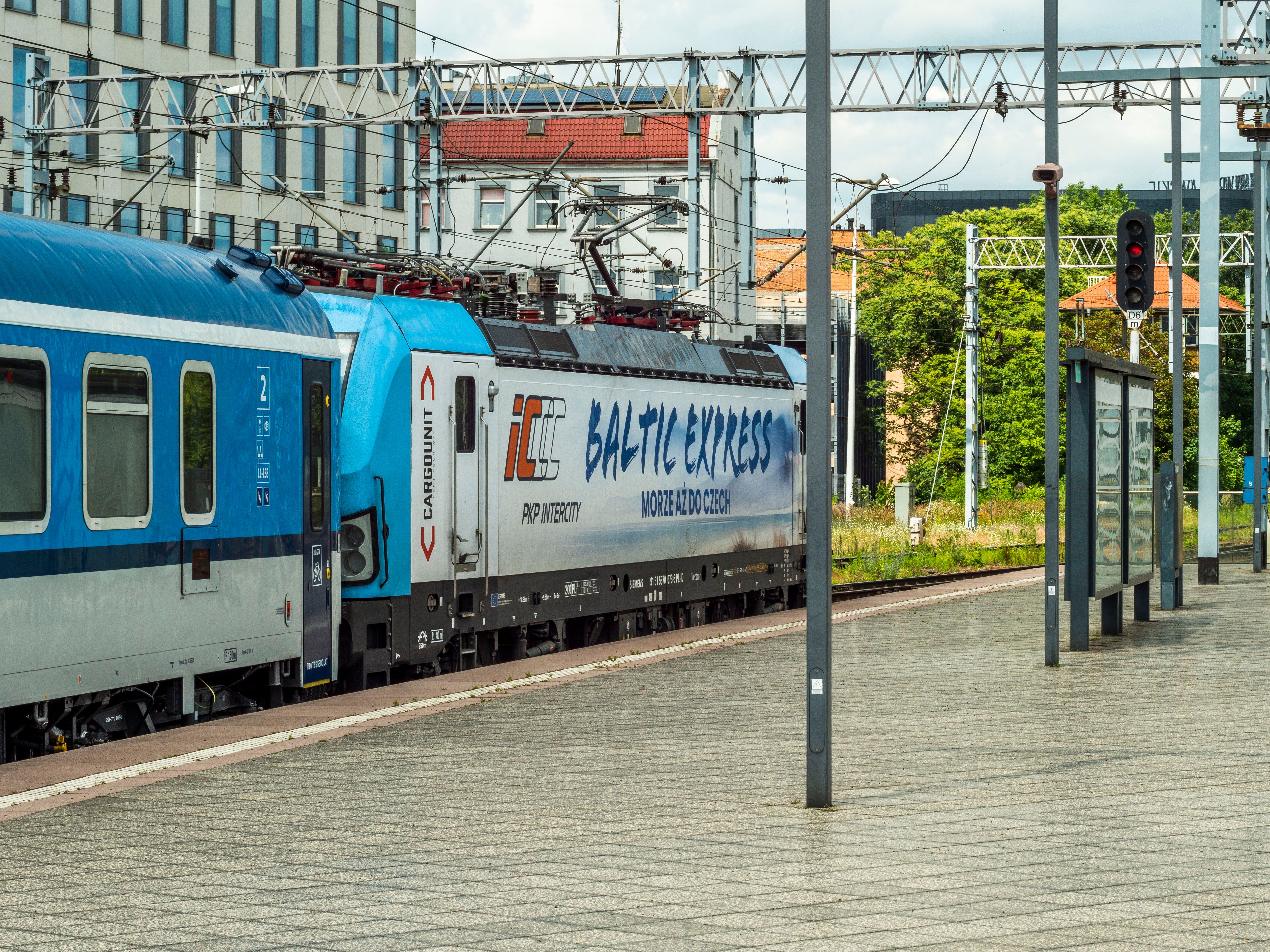 Baltic Express Train at Urban Railway Station · Free Stock Photo