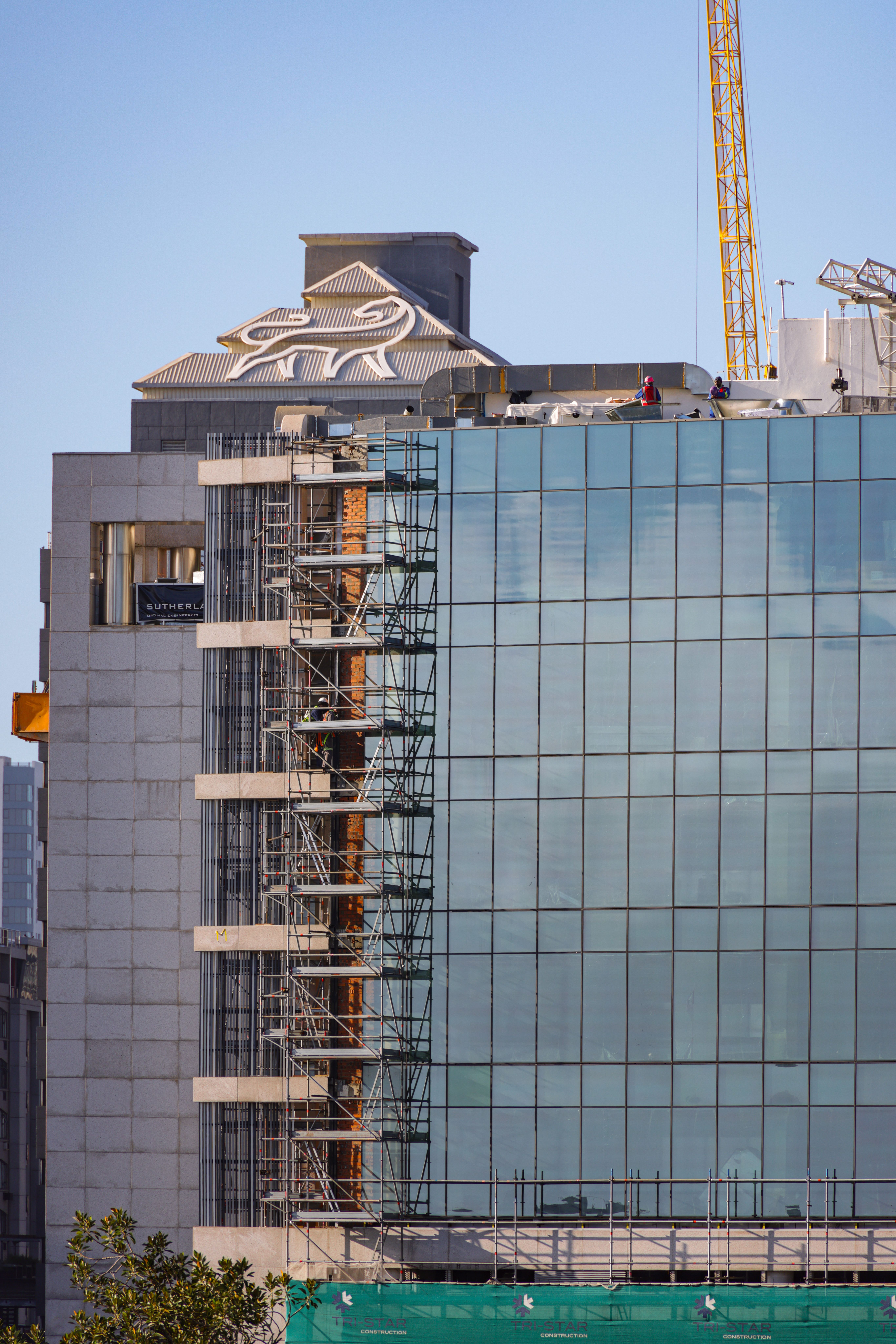 Modern Office Building Under Construction with Glass Facade · Free ...