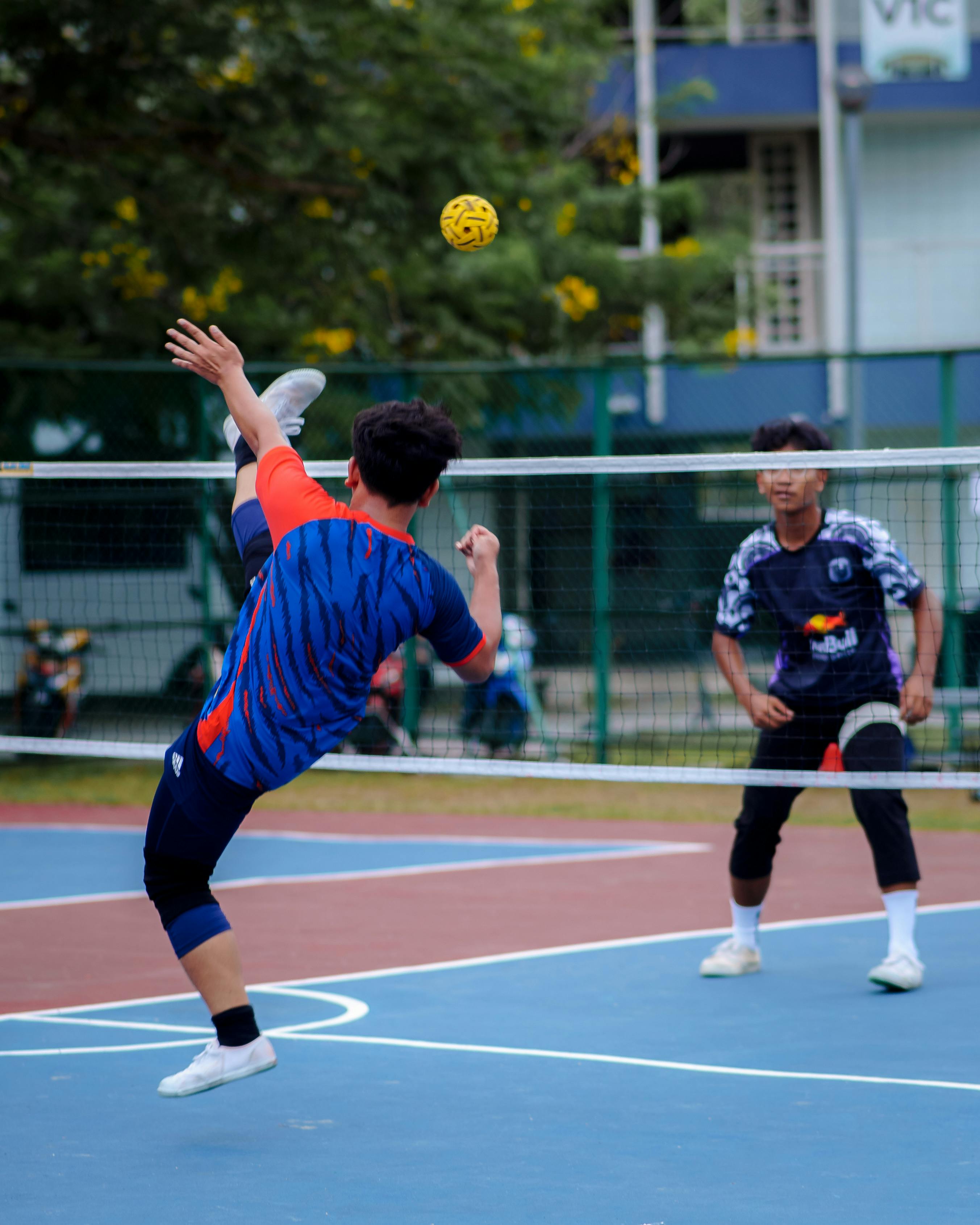 Dynamic Sepak Takraw Match in Action Outdoors · Free Stock Photo