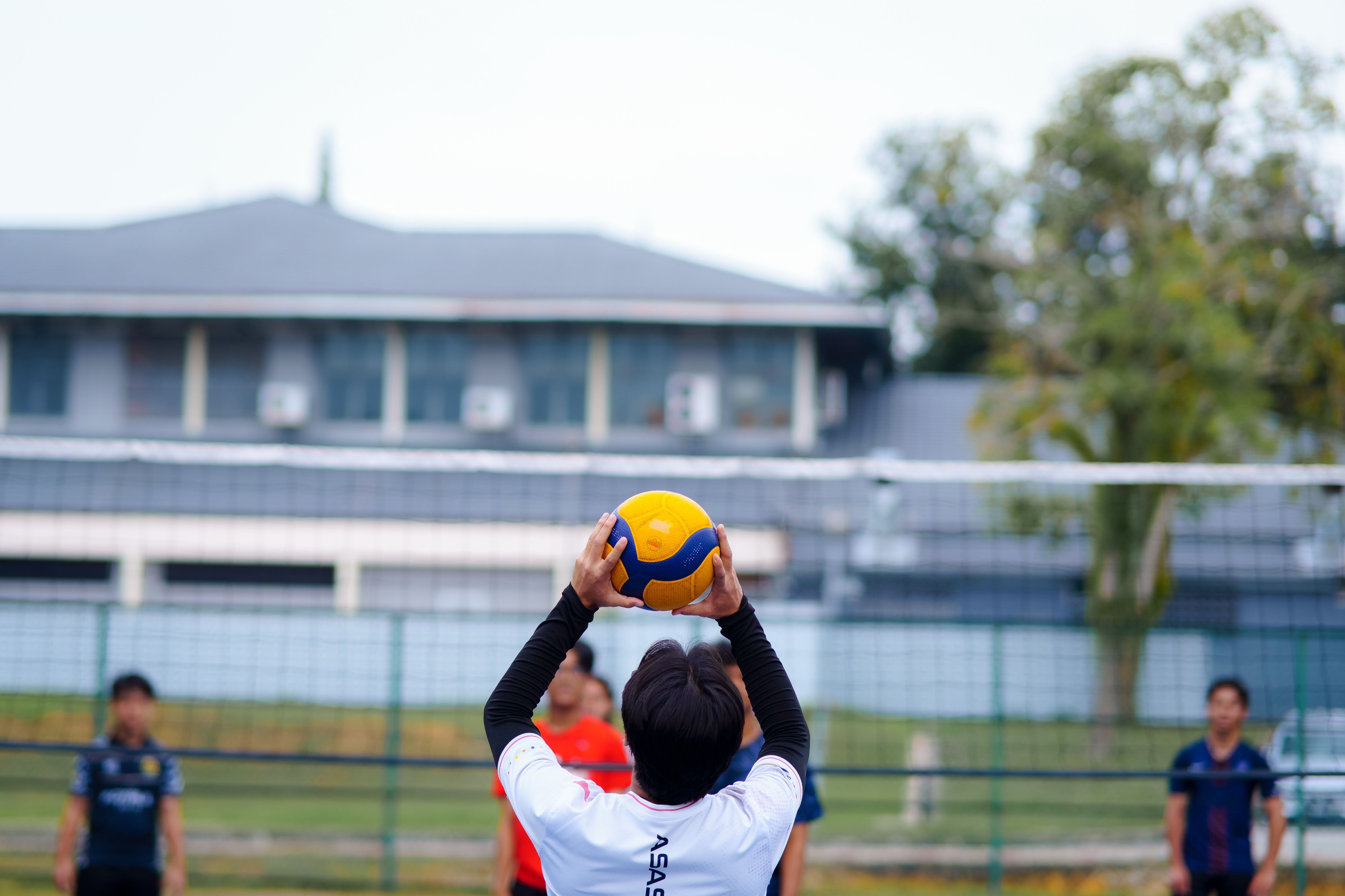 Exciting Outdoor Volleyball Game Action Shot · Free Stock Photo