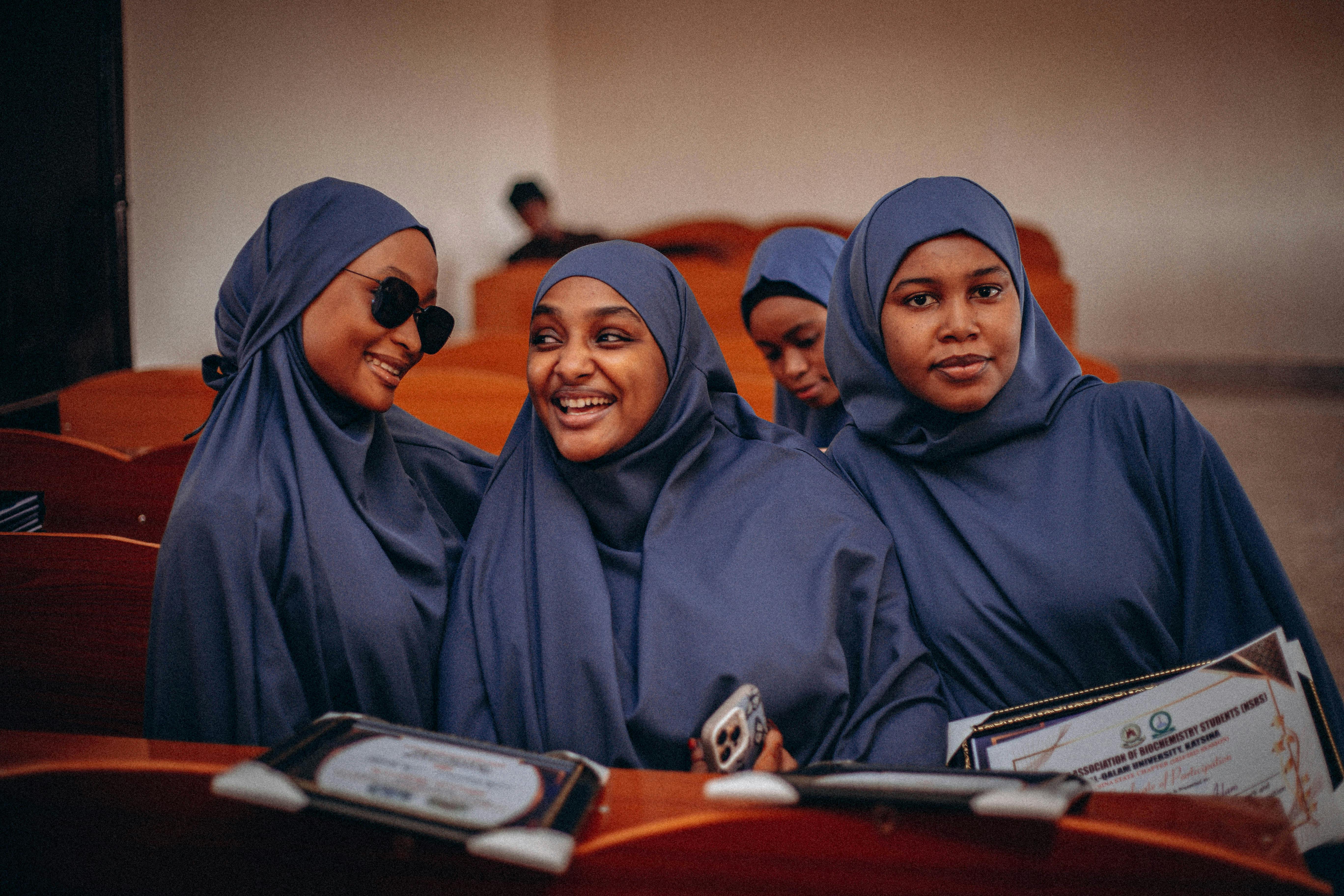 Graduating Students Celebrating at Ceremony · Free Stock Photo