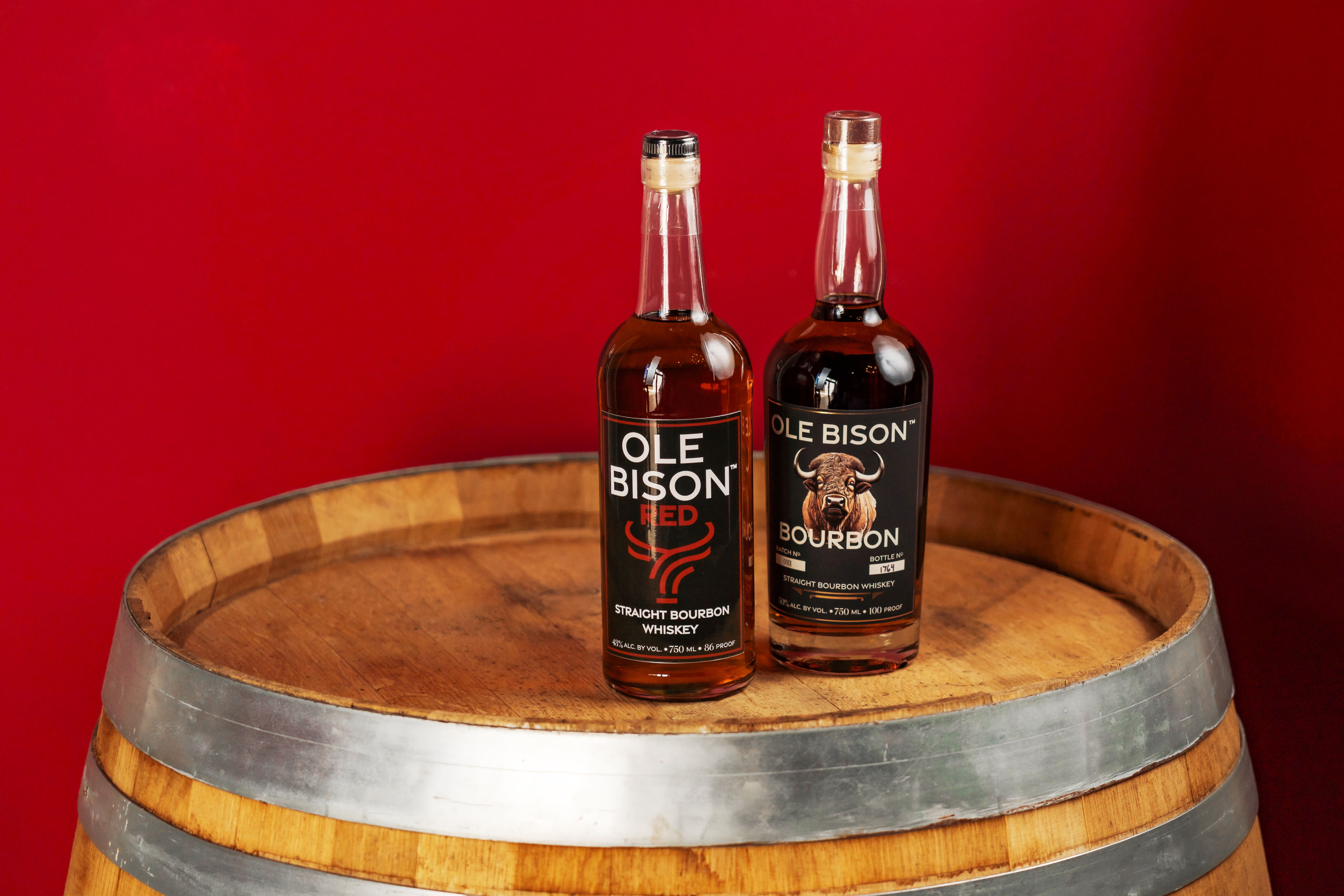 Ole Bison Vodka and Gold Bottles in Bar Setting · Free Stock Photo