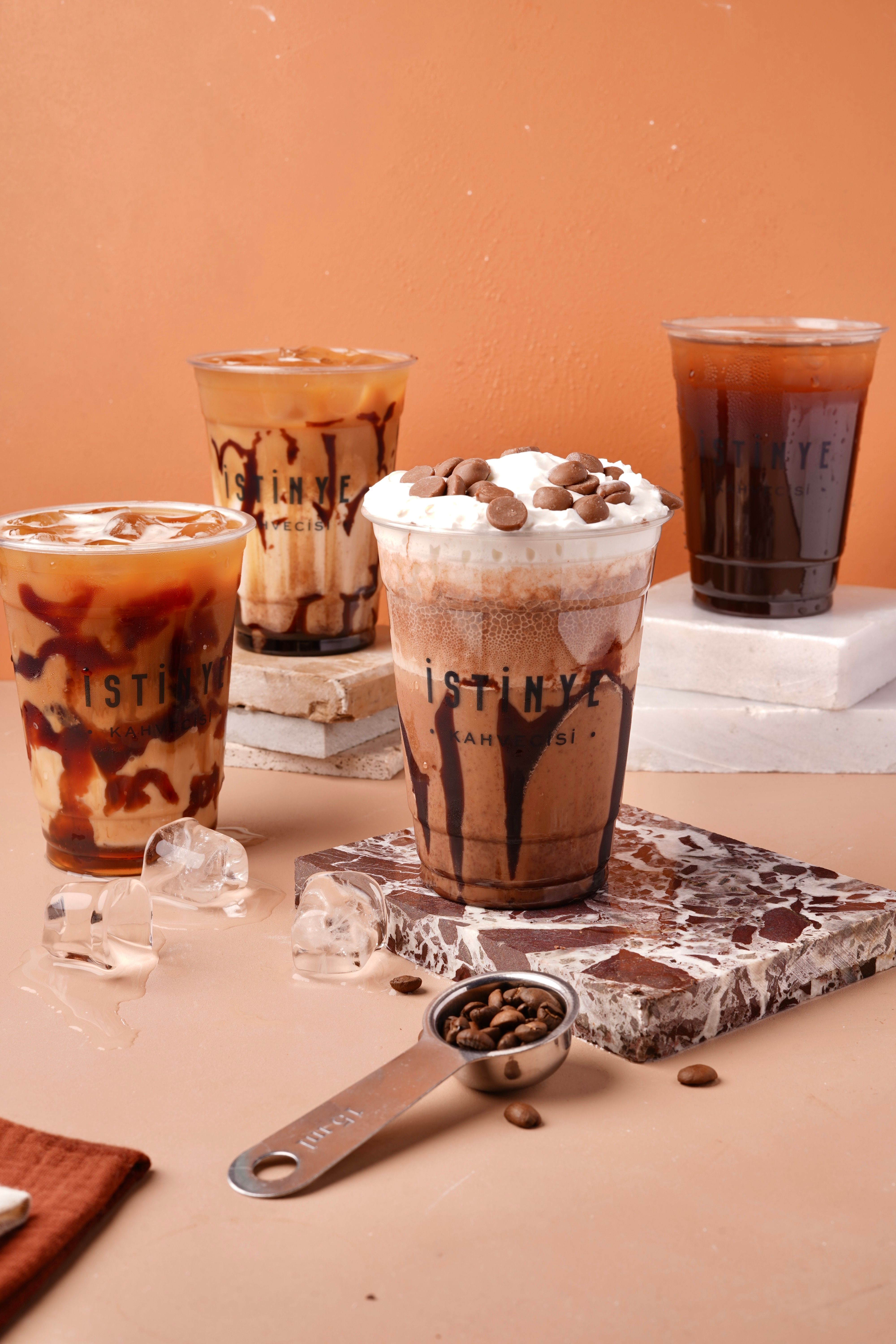 Assorted Iced Coffee Drinks on Marble Table · Free Stock Photo