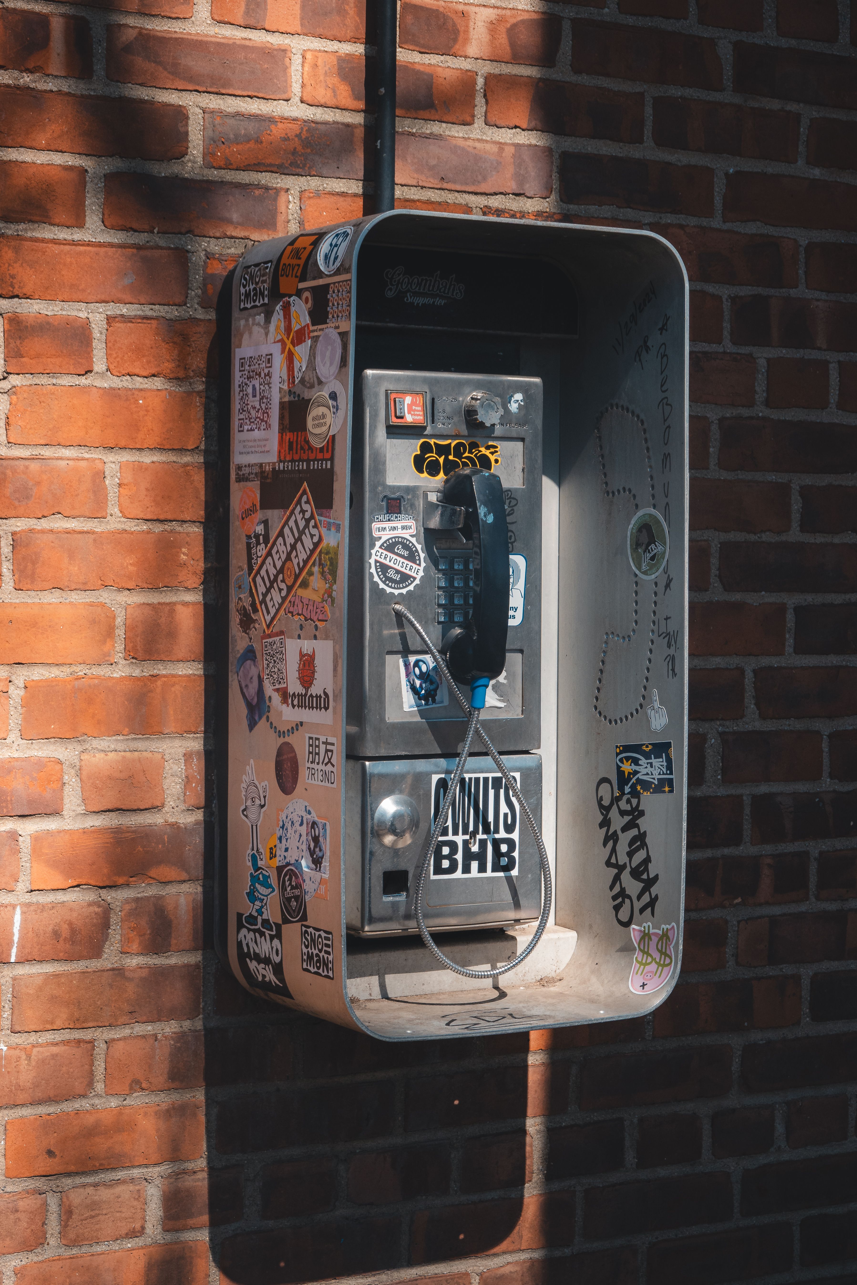 Vintage Payphone on Brick Wall in New York City · Free Stock Photo