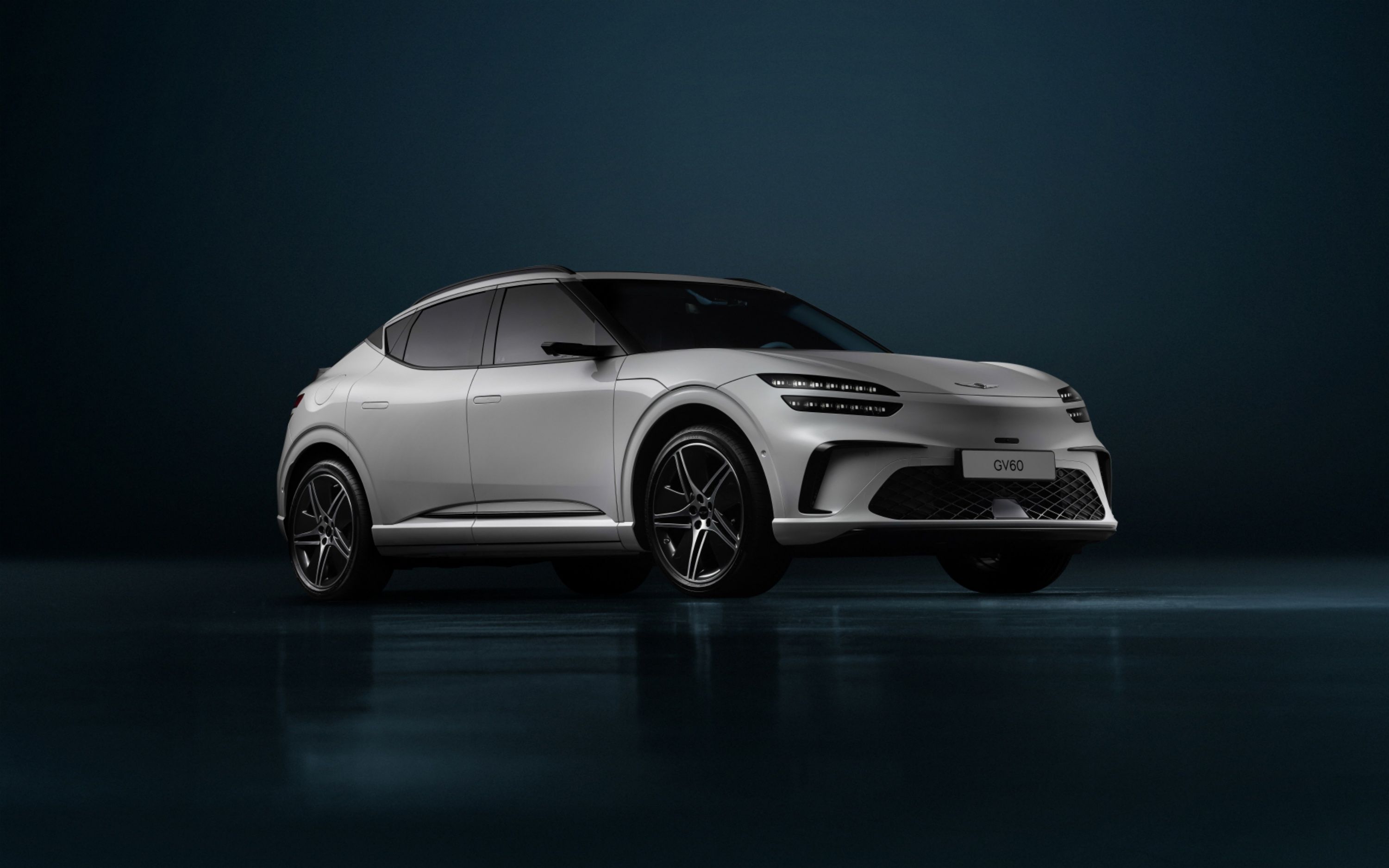Sleek Genesis GV60 Electric SUV in Studio Lighting · Free Stock Photo