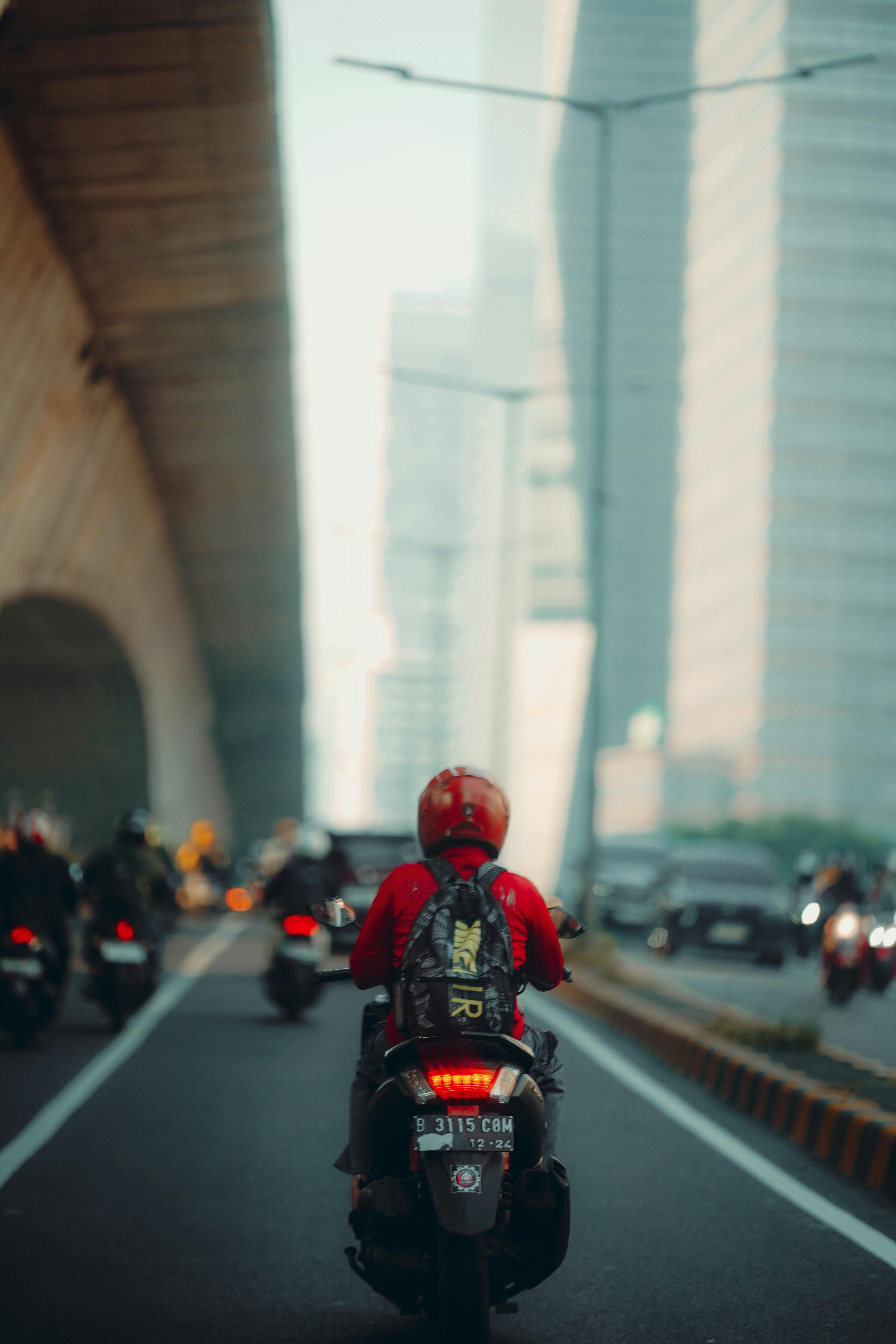 Motorcycle Commute through Jakarta City Traffic · Free Stock Photo