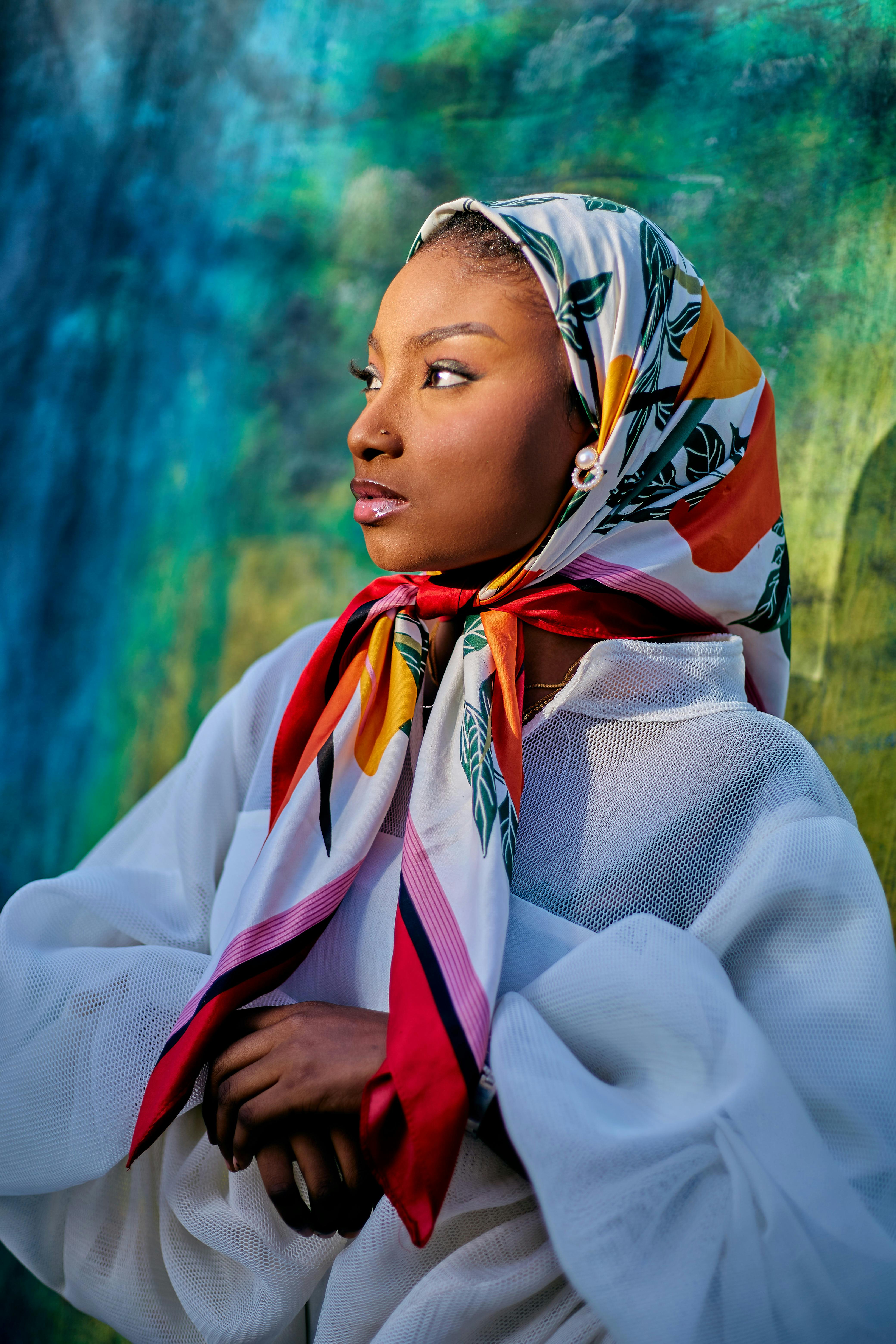 Portrait of Woman in Colorful Headscarf Outdoors · Free Stock Photo