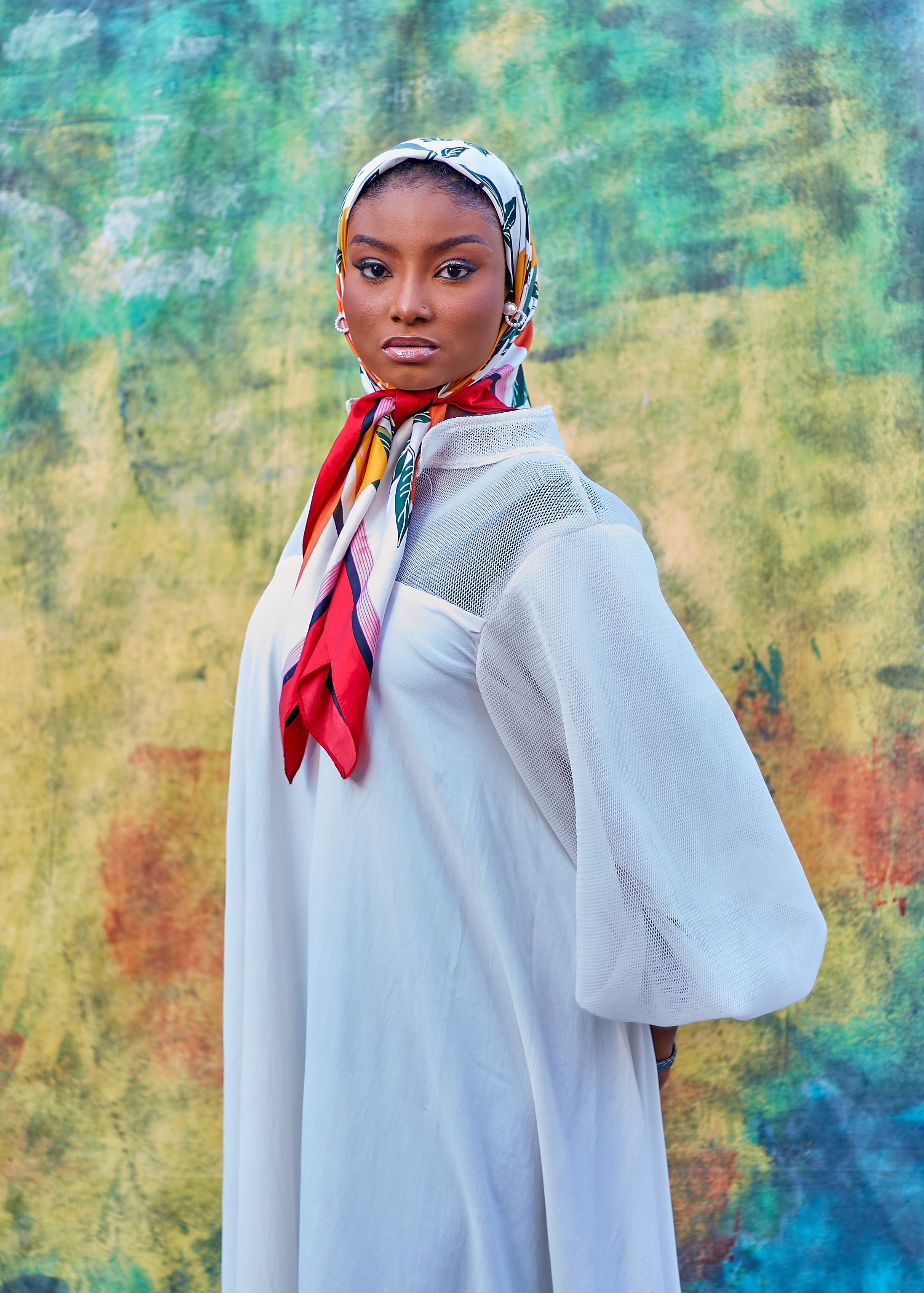 Elegant Portrait of Woman with Colorful Scarf · Free Stock Photo