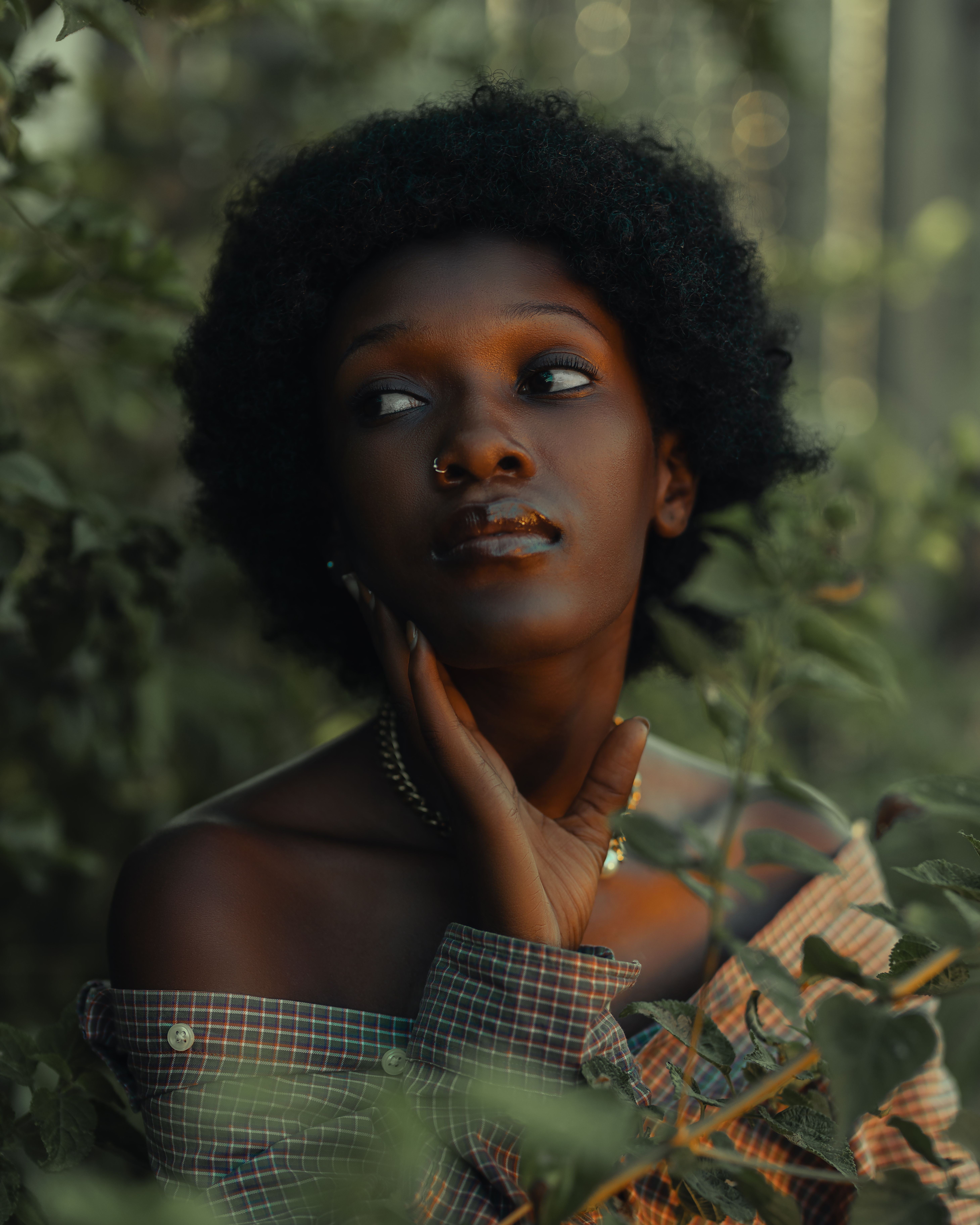 Elegant Portrait of Woman in Lush Greenery · Free Stock Photo