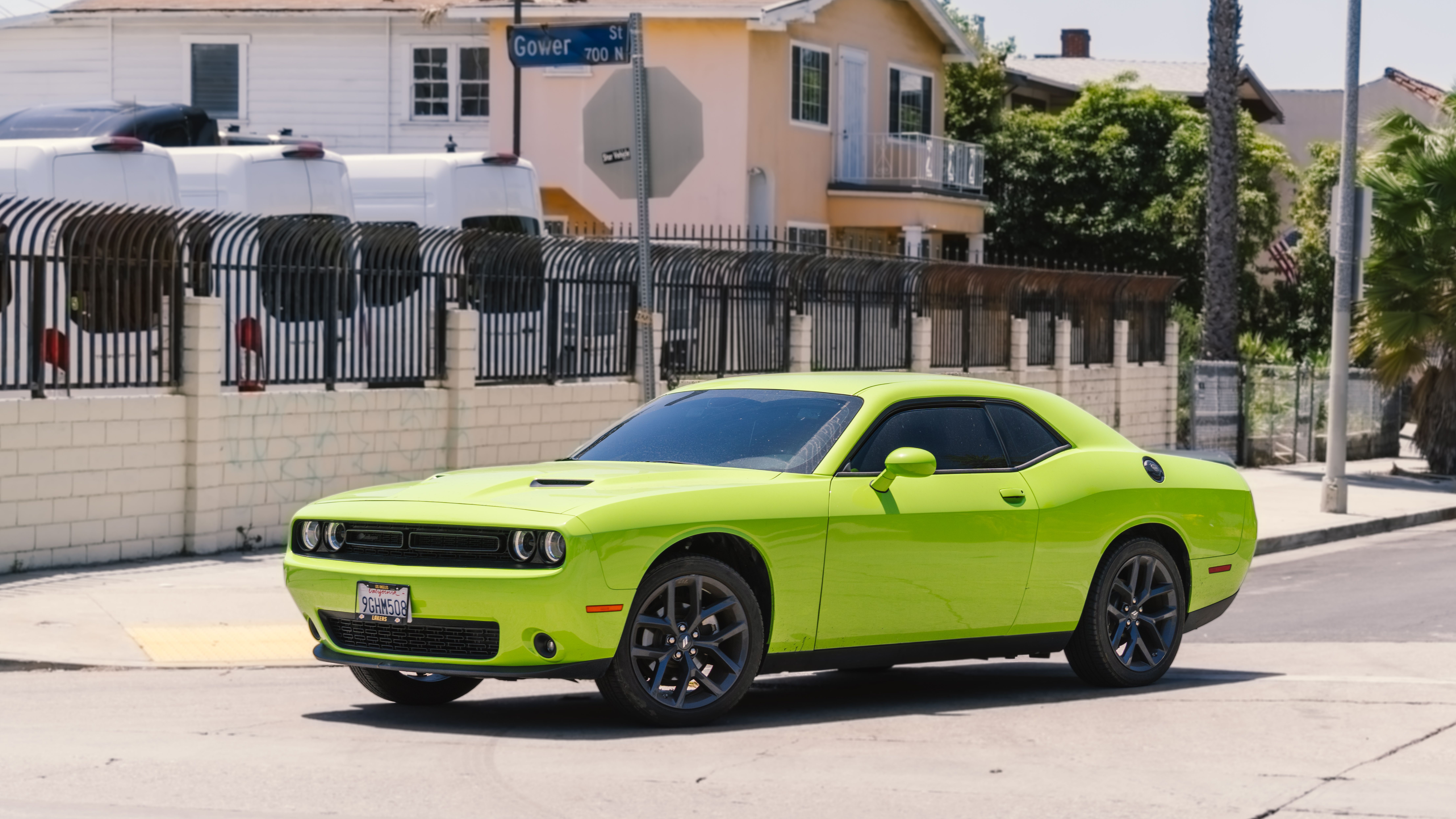 Bright Green Muscle Car on Urban Street · Free Stock Photo