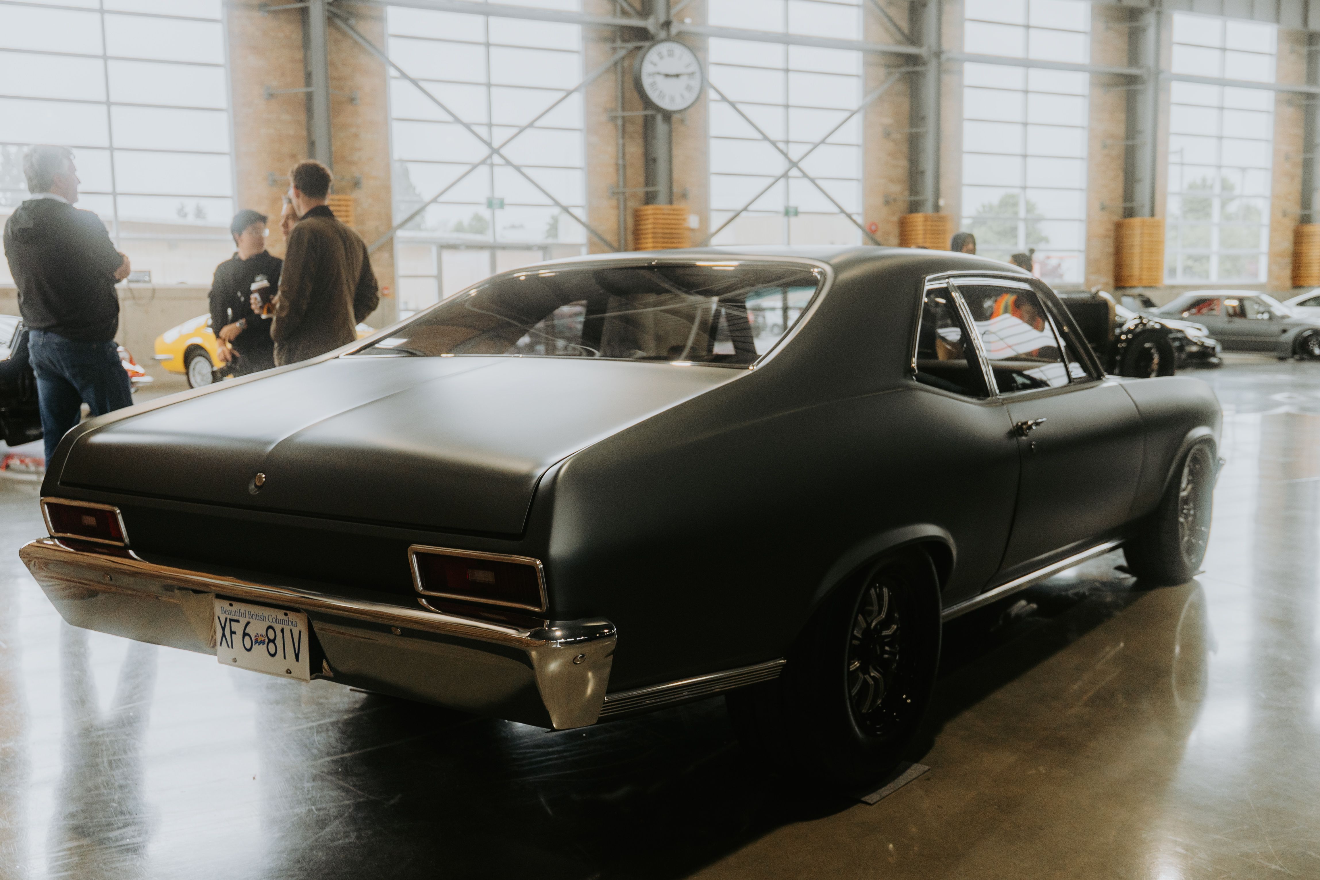 Classic Car in Indoor Exhibition Setting · Free Stock Photo